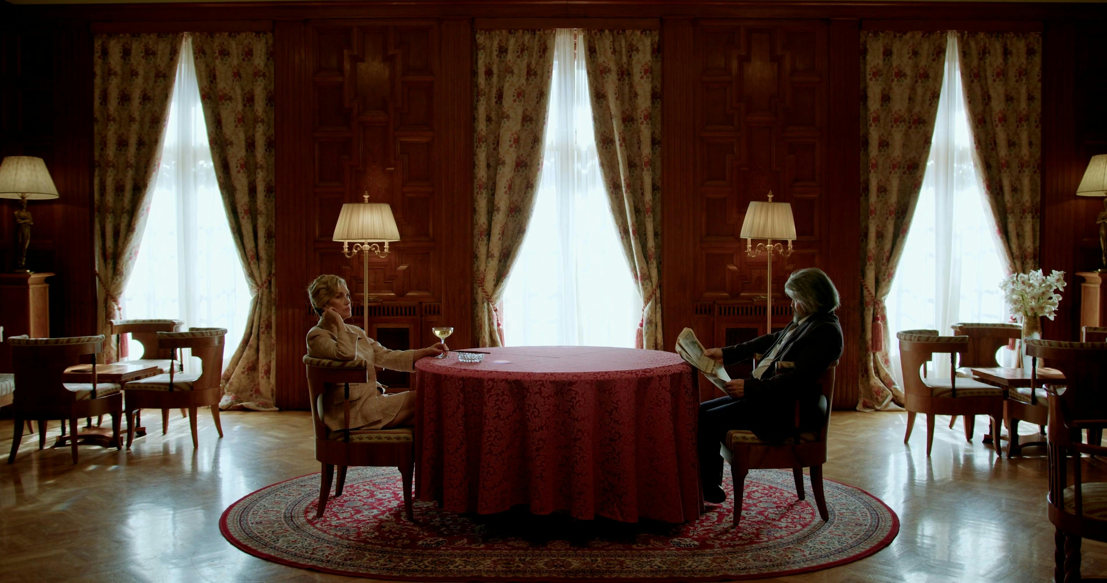 Elderly People Sitting on the Both Side of Round Table While Having a ...