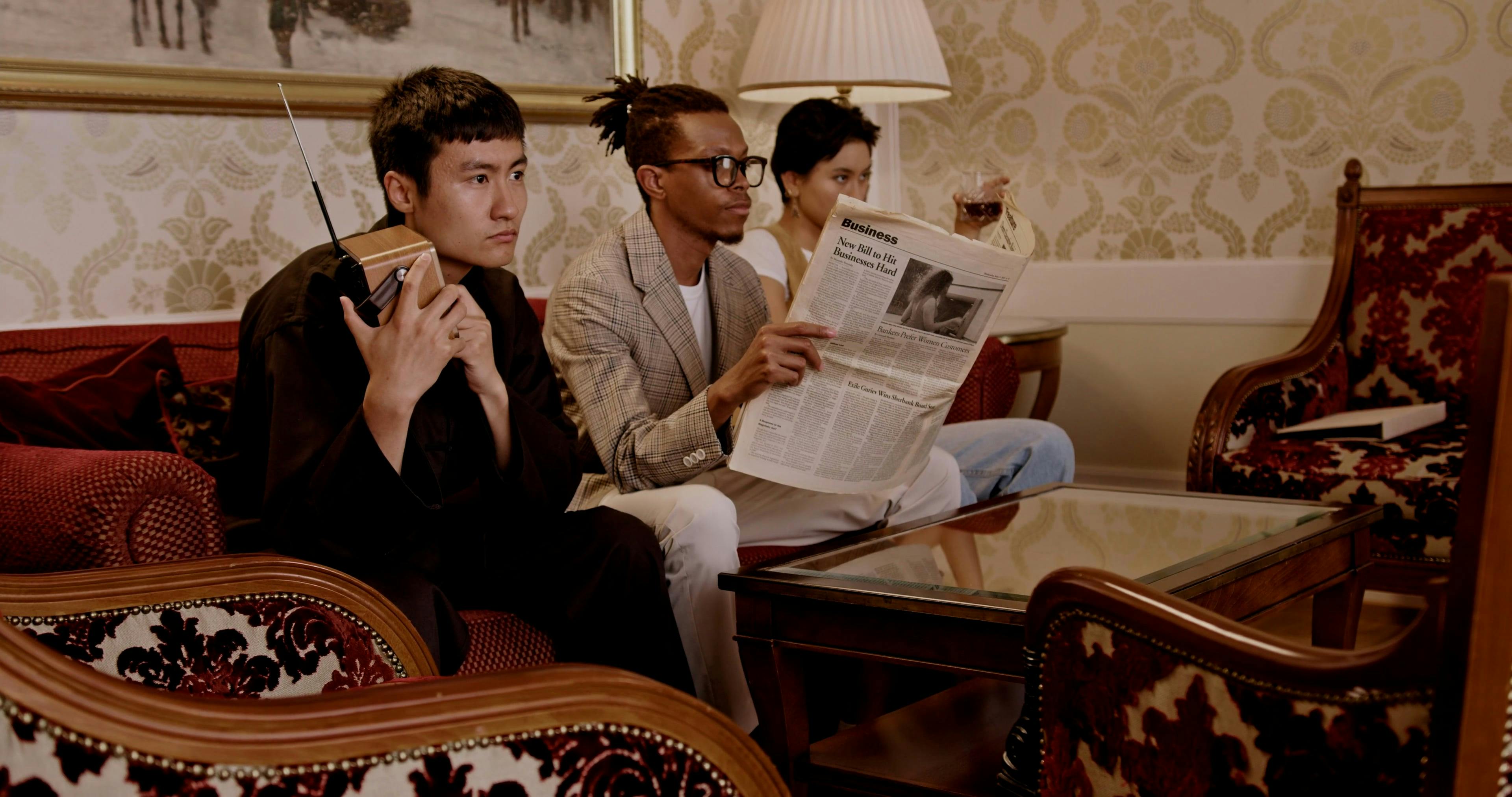 People Holding Different Objects Seriously Looking at Camera Free Stock ...