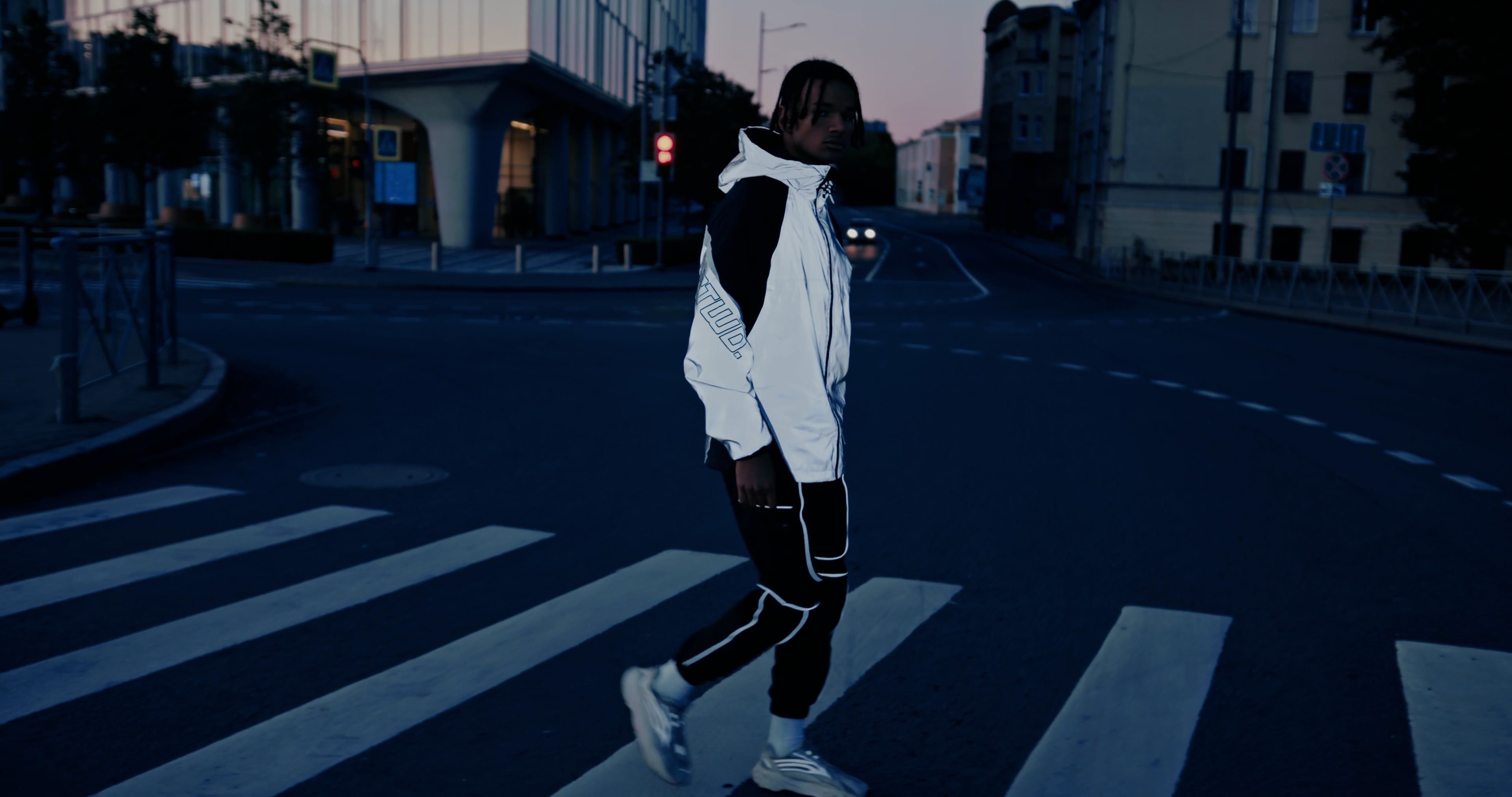 Male Pedestrian in Reflective Jacket Crossing Street and Looking at ...