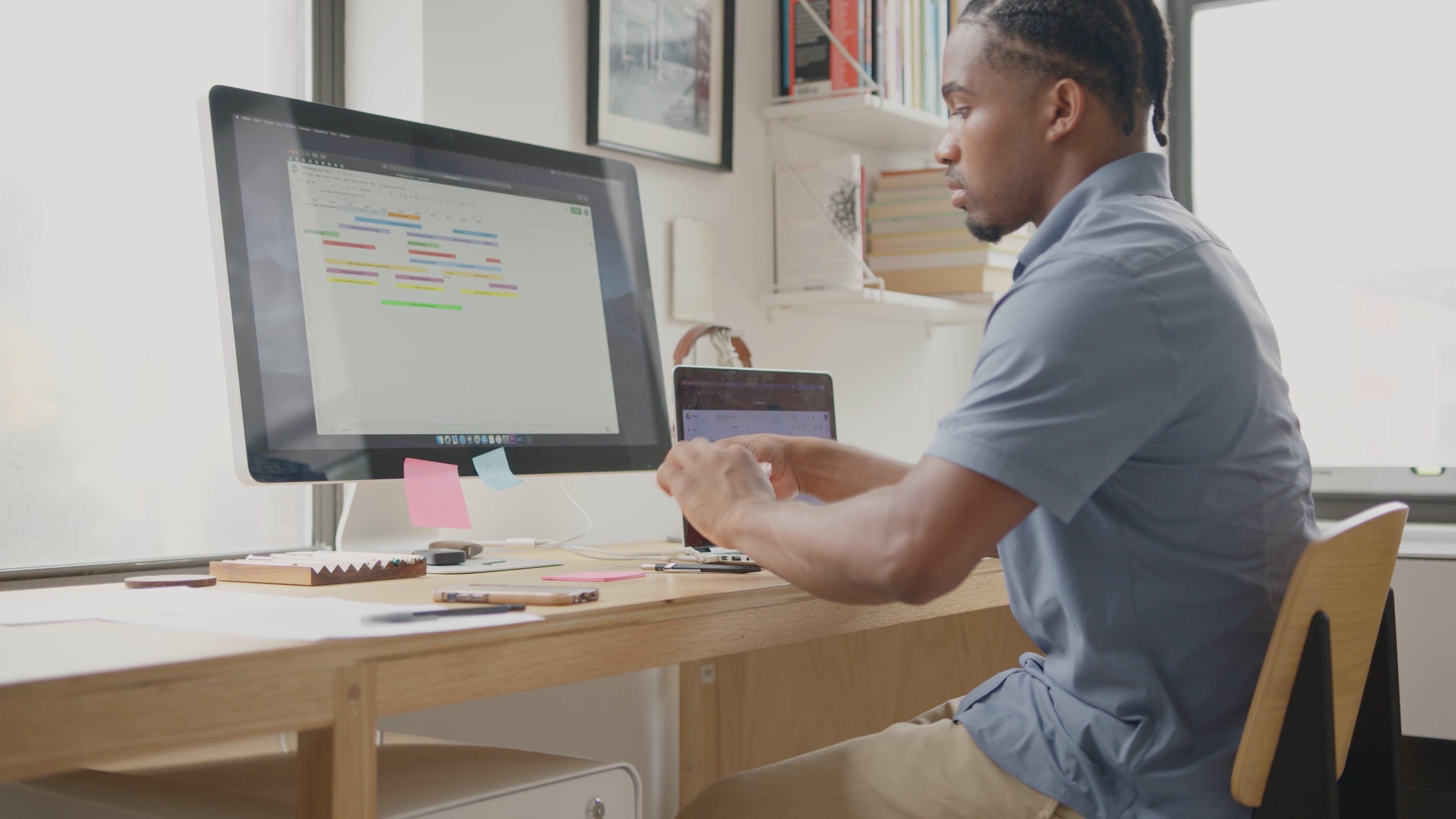 Man Putting Sticky Notes on Screen while Working Free Stock Video ...