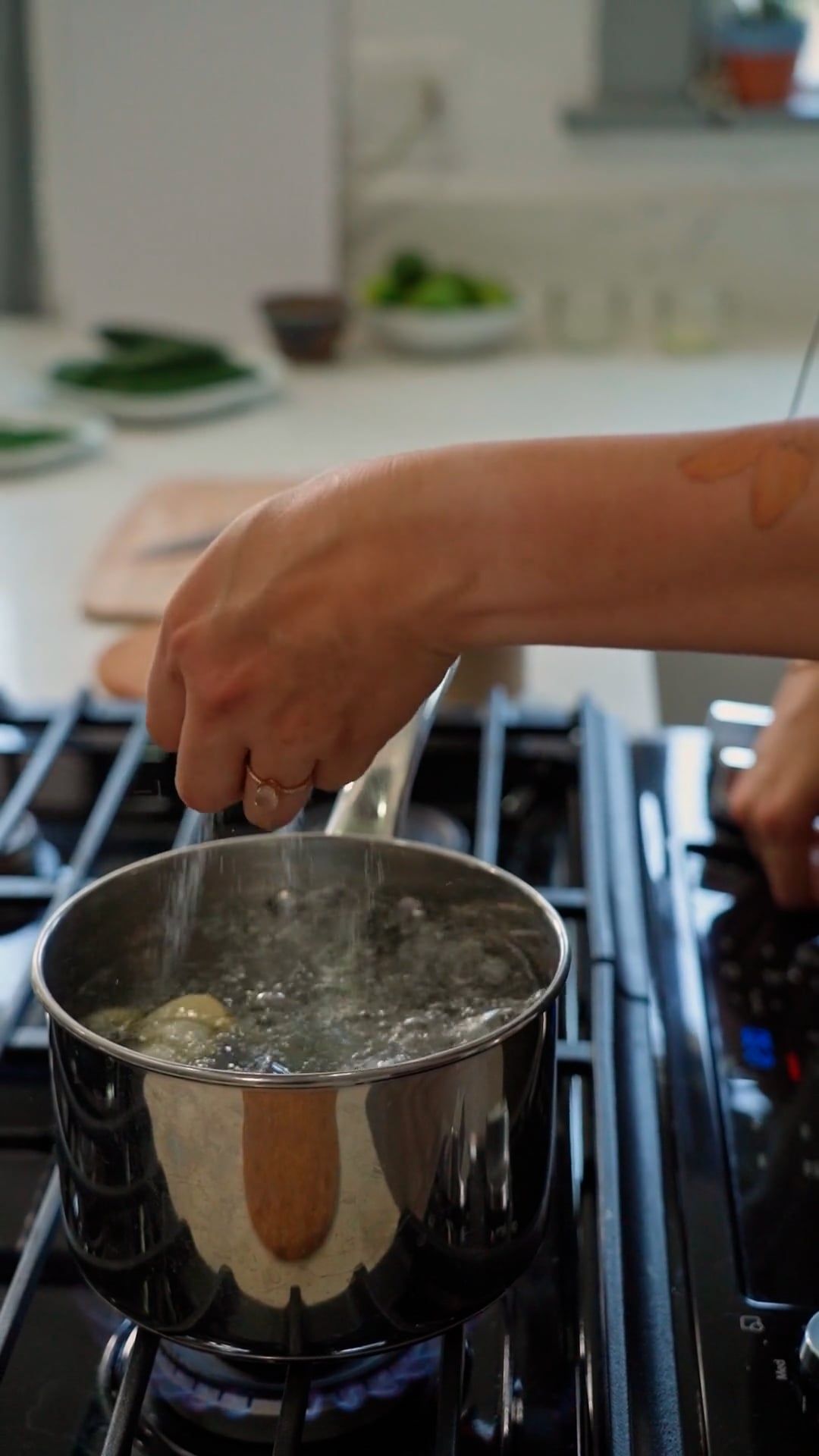 A Person Adding a Salt in the Cooking Pot Free Stock Video Footage ...