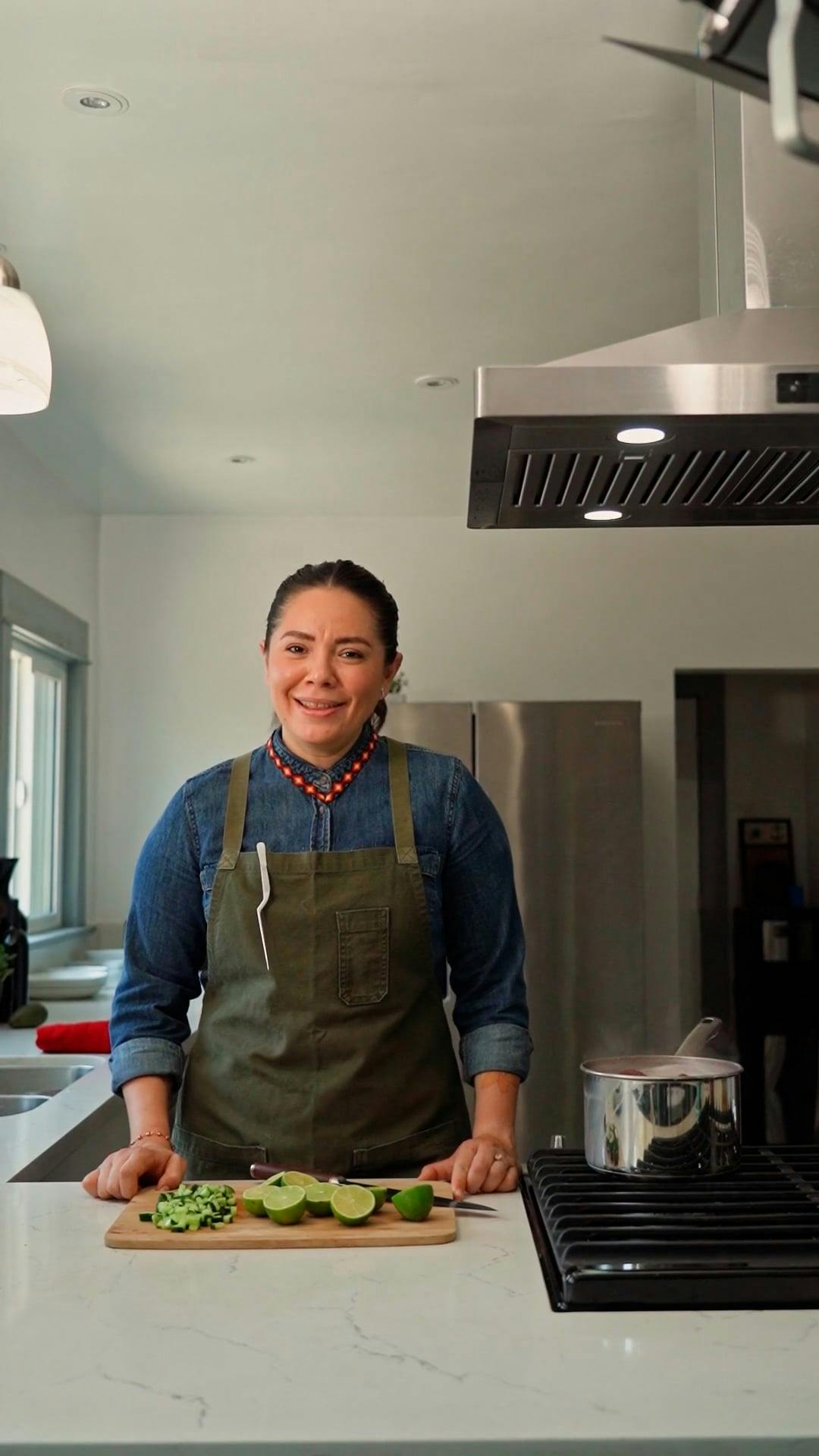 A Woman Talking while Giving Instructions in the Kitchen Free Stock ...