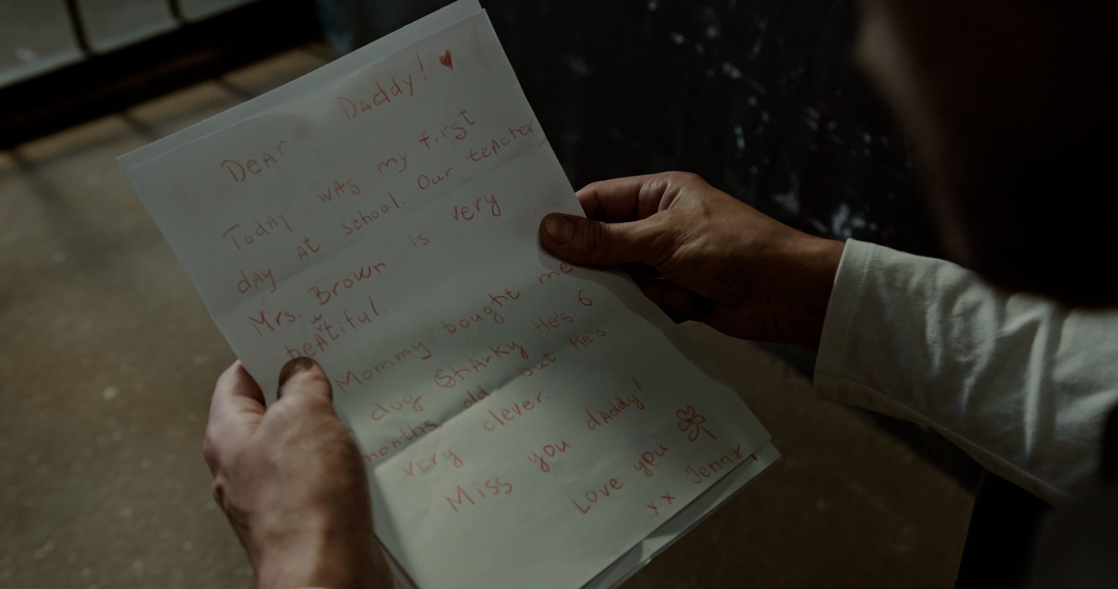 A Convict Looking at a Letter and Drawings from his Daughter Free Stock ...