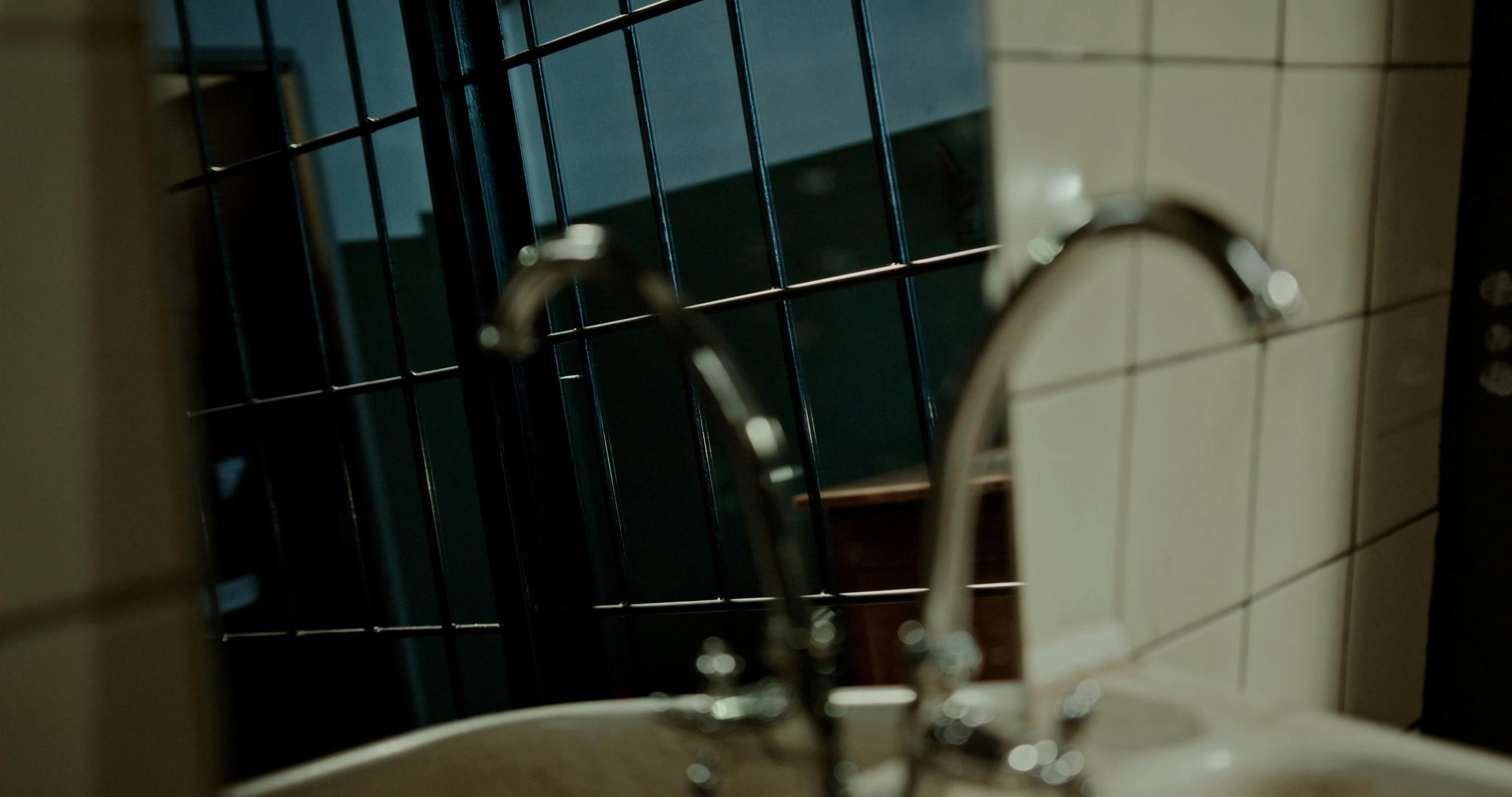 A Policeman Putting an Inmate Man Inside the Jail · Free Stock Video