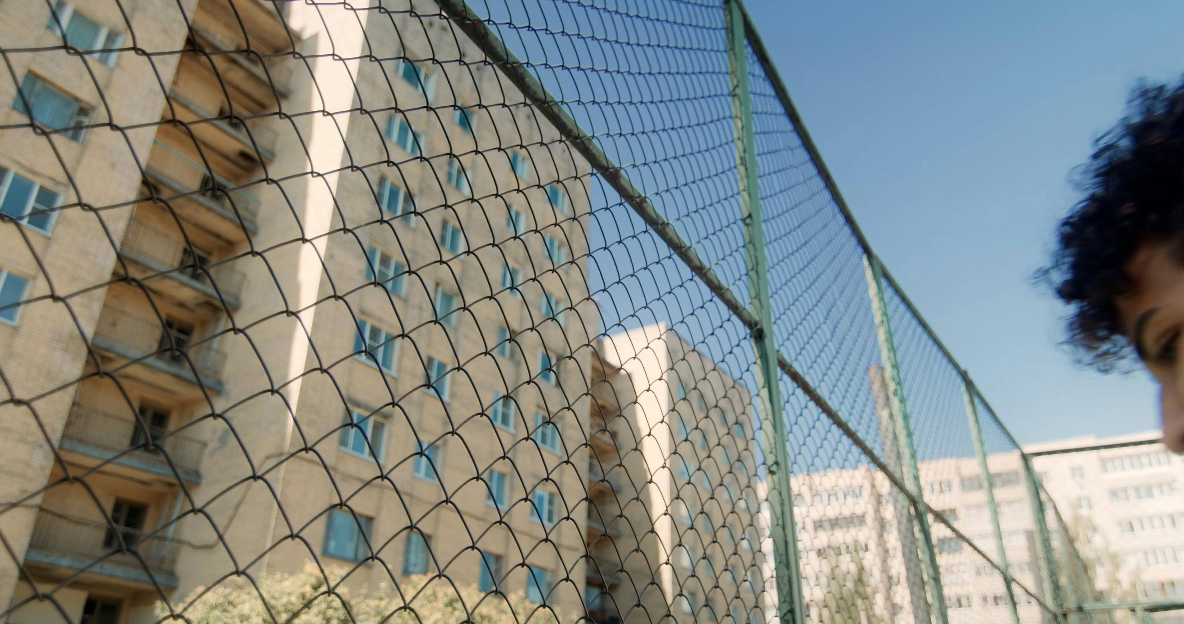 Man Holding Fence Free Stock Video Footage, Royalty-Free 4K & HD Video Clip
