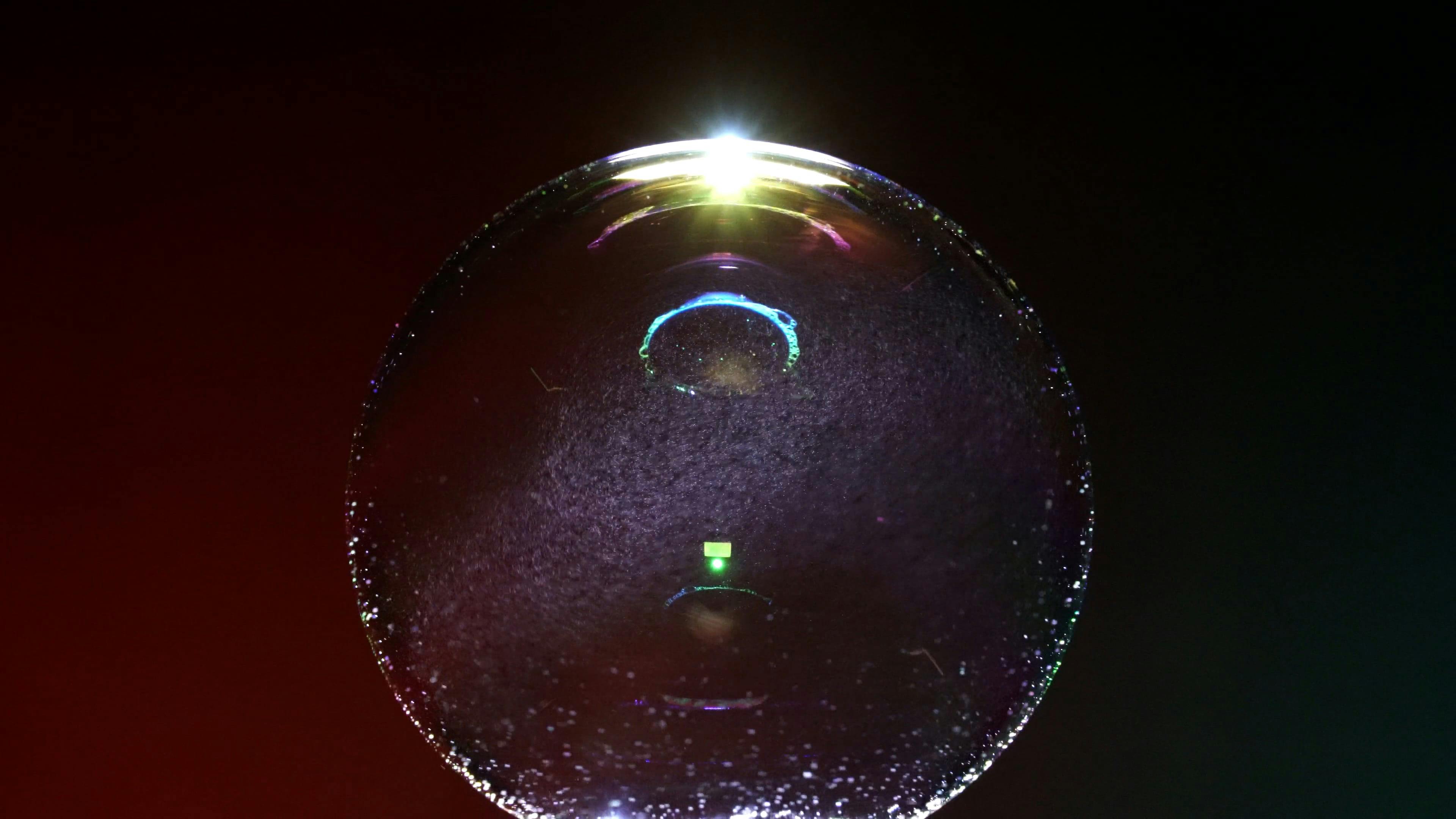Rainbow Visible Cause Lights Reflections On A Bubble · Free Stock Video
