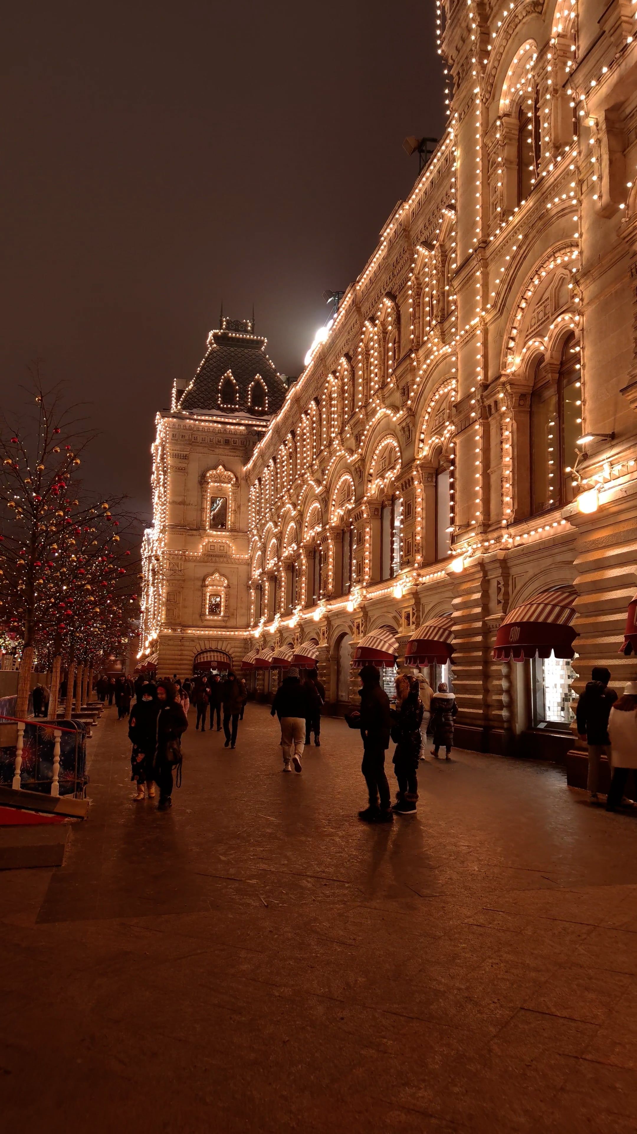 People Walking by Buildings Decorated for Christmas Free Stock Video ...