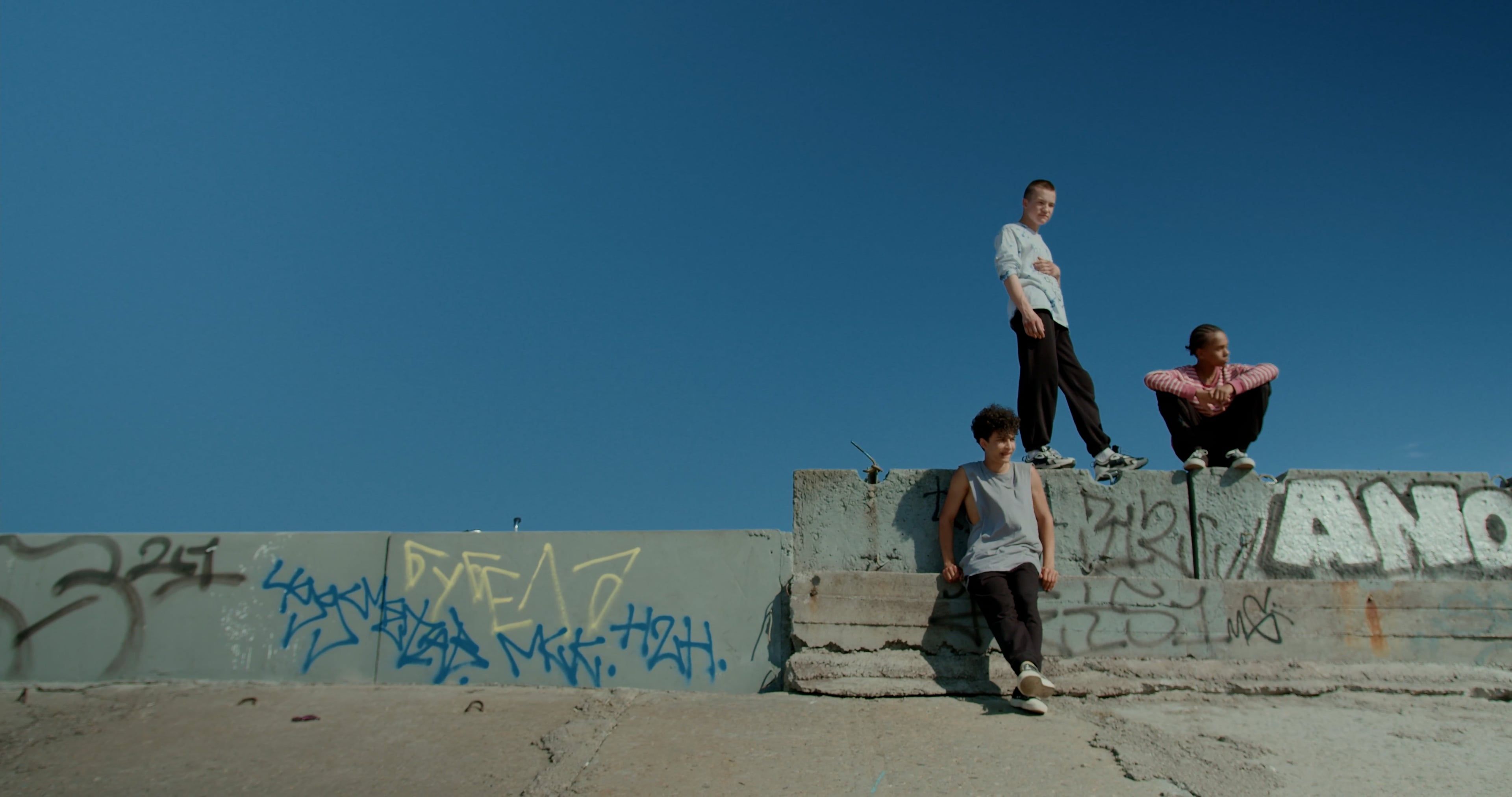 Teenagers Sitting and Standing by Wall Free Stock Video Footage ...