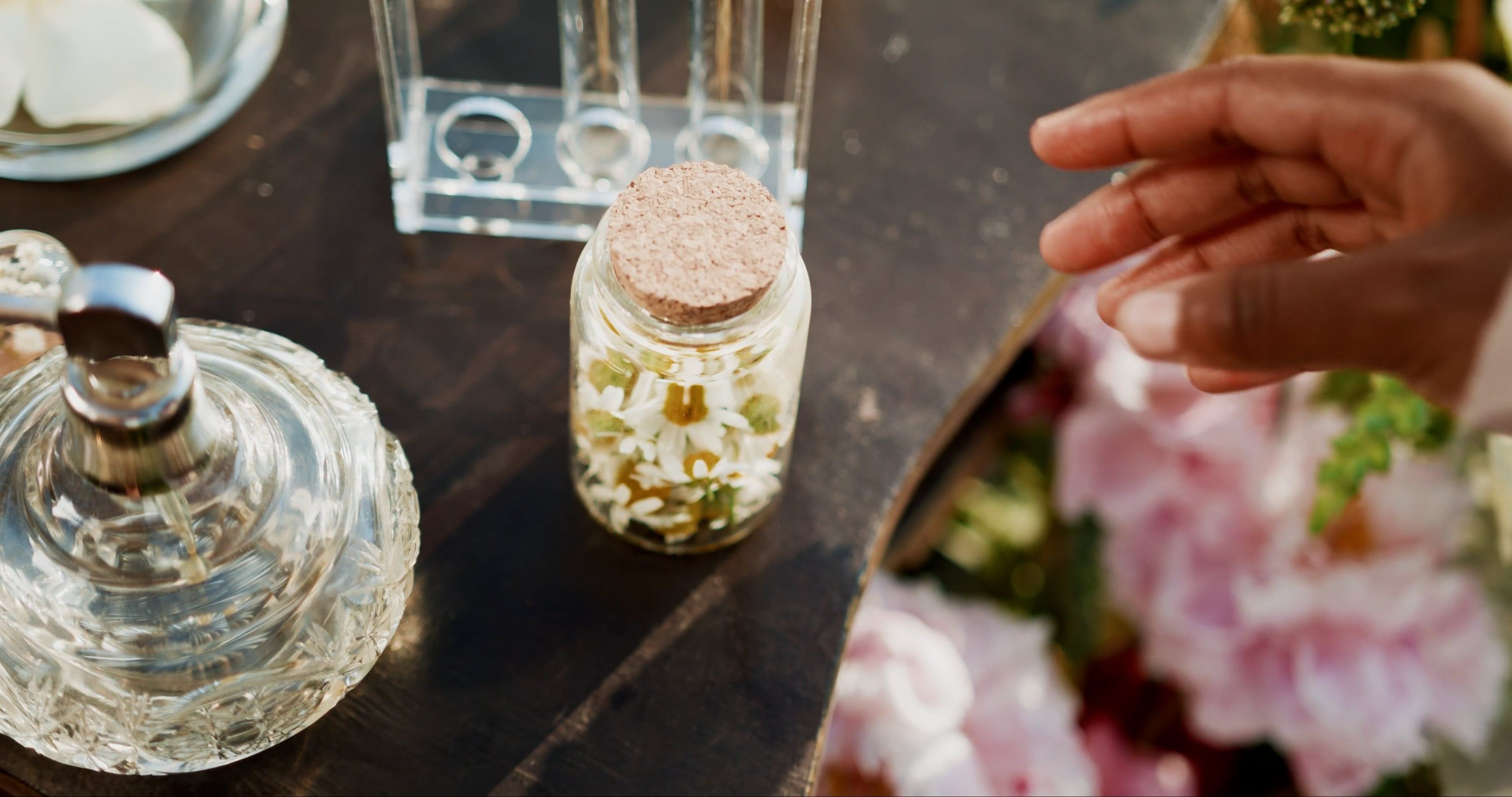 A Person Pouring a Jar of Flowers on a Table Free Stock Video Footage ...