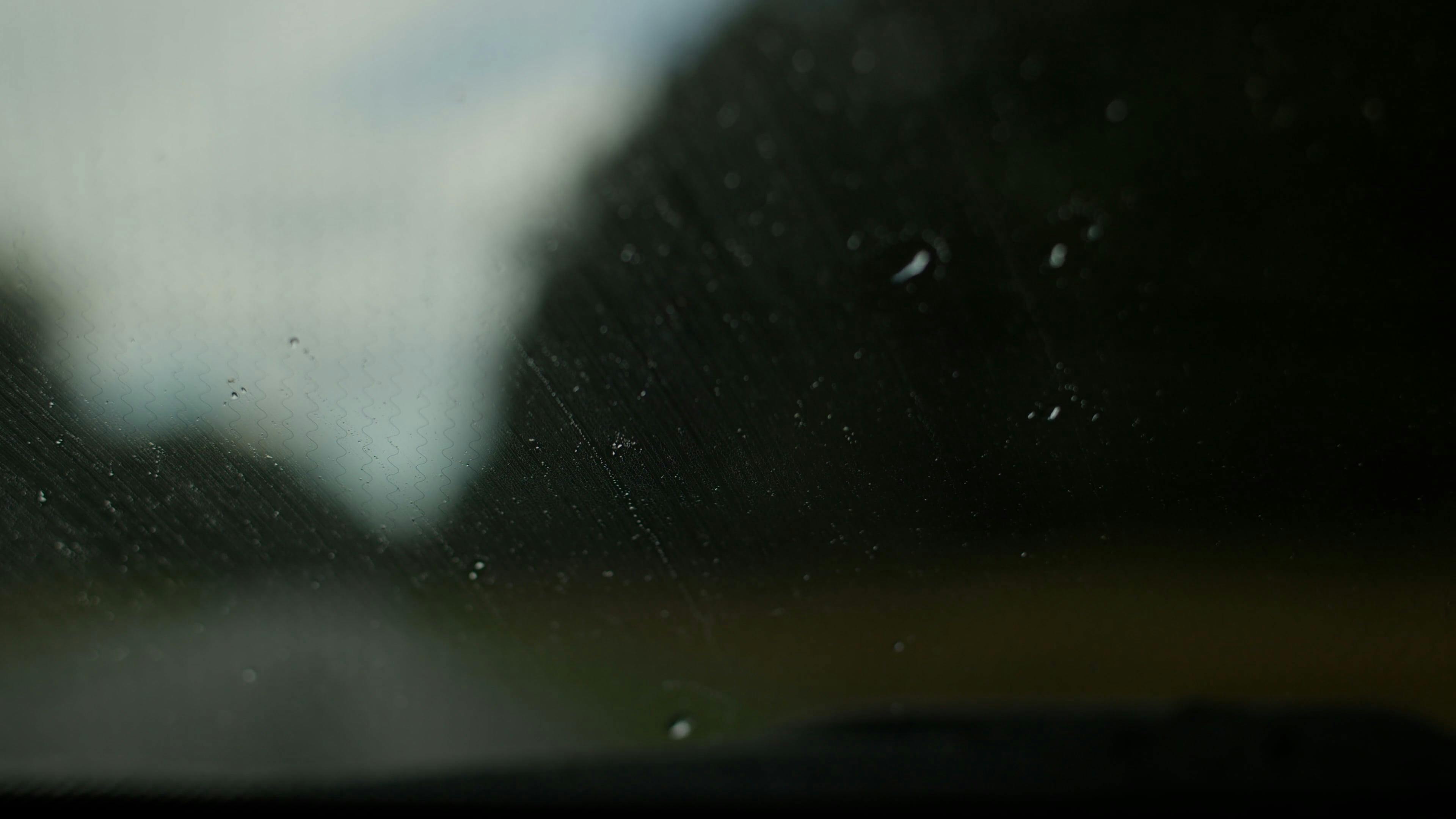 Raindrops on a Vehicle Windshield · Free Stock Video