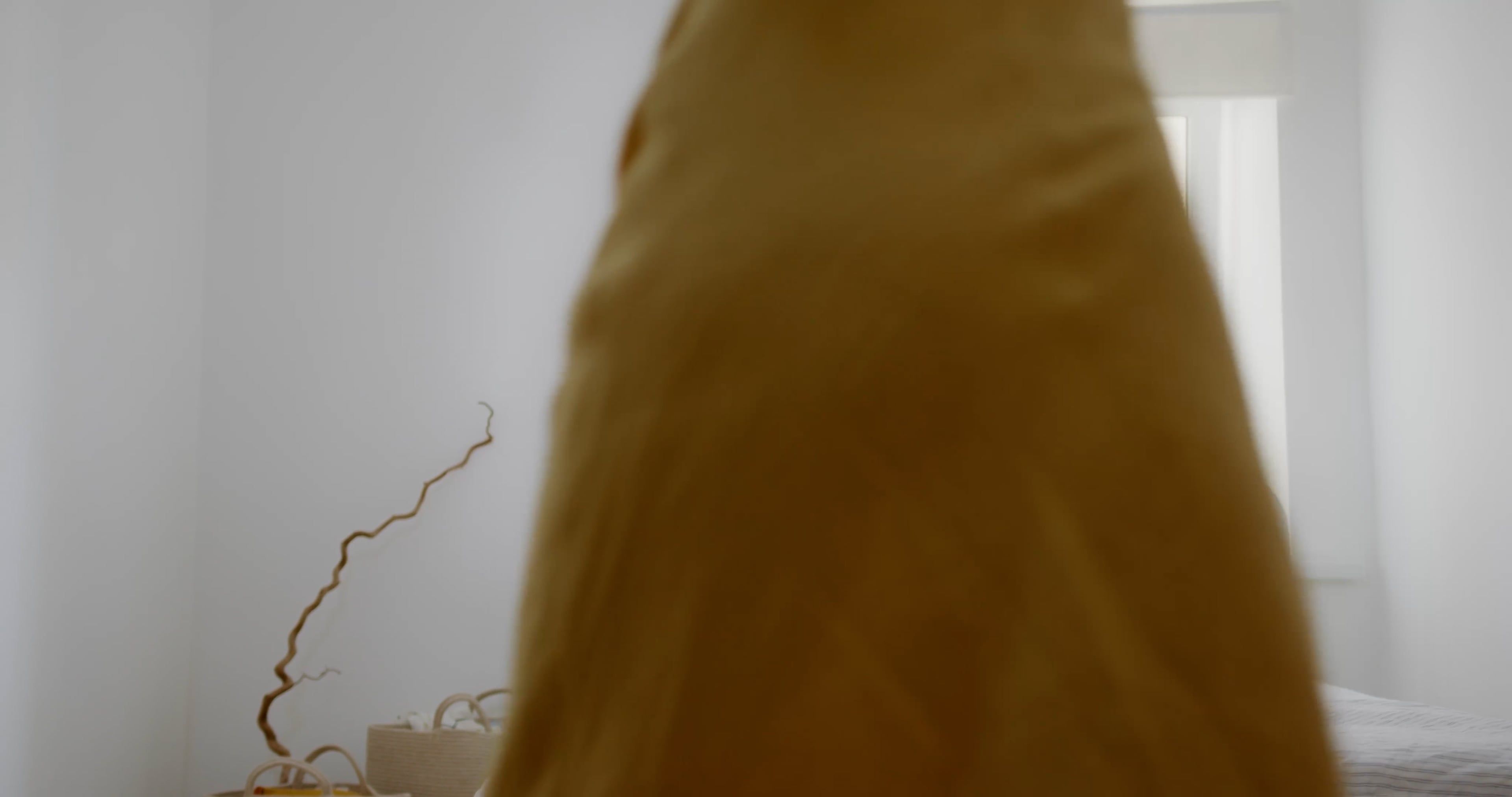 A Woman Laying Down a Blanket on a Bed with her Daughter Free Stock ...