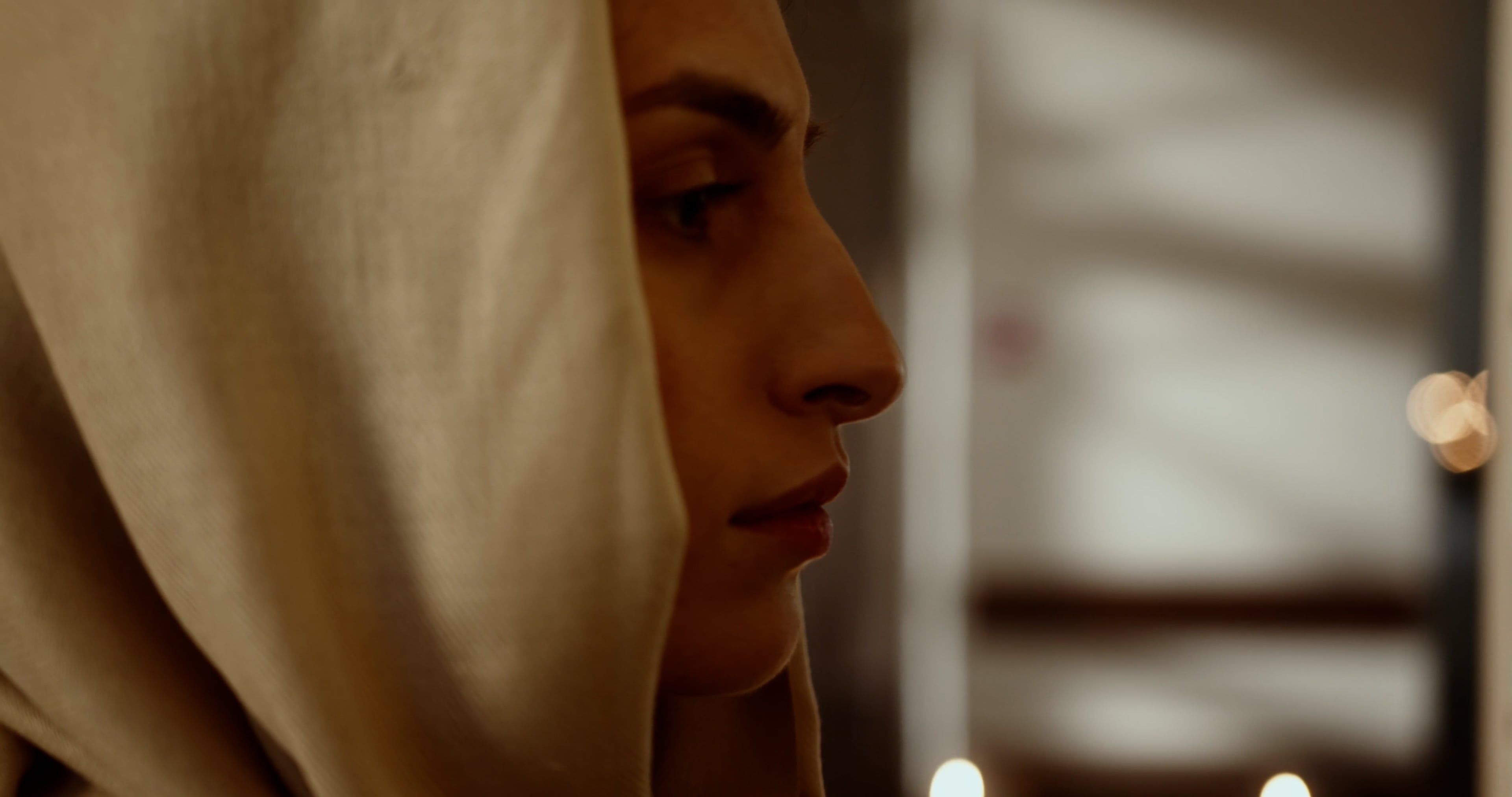 Close up Shot of a Woman Kissing a Religious Icon in a Church Free ...