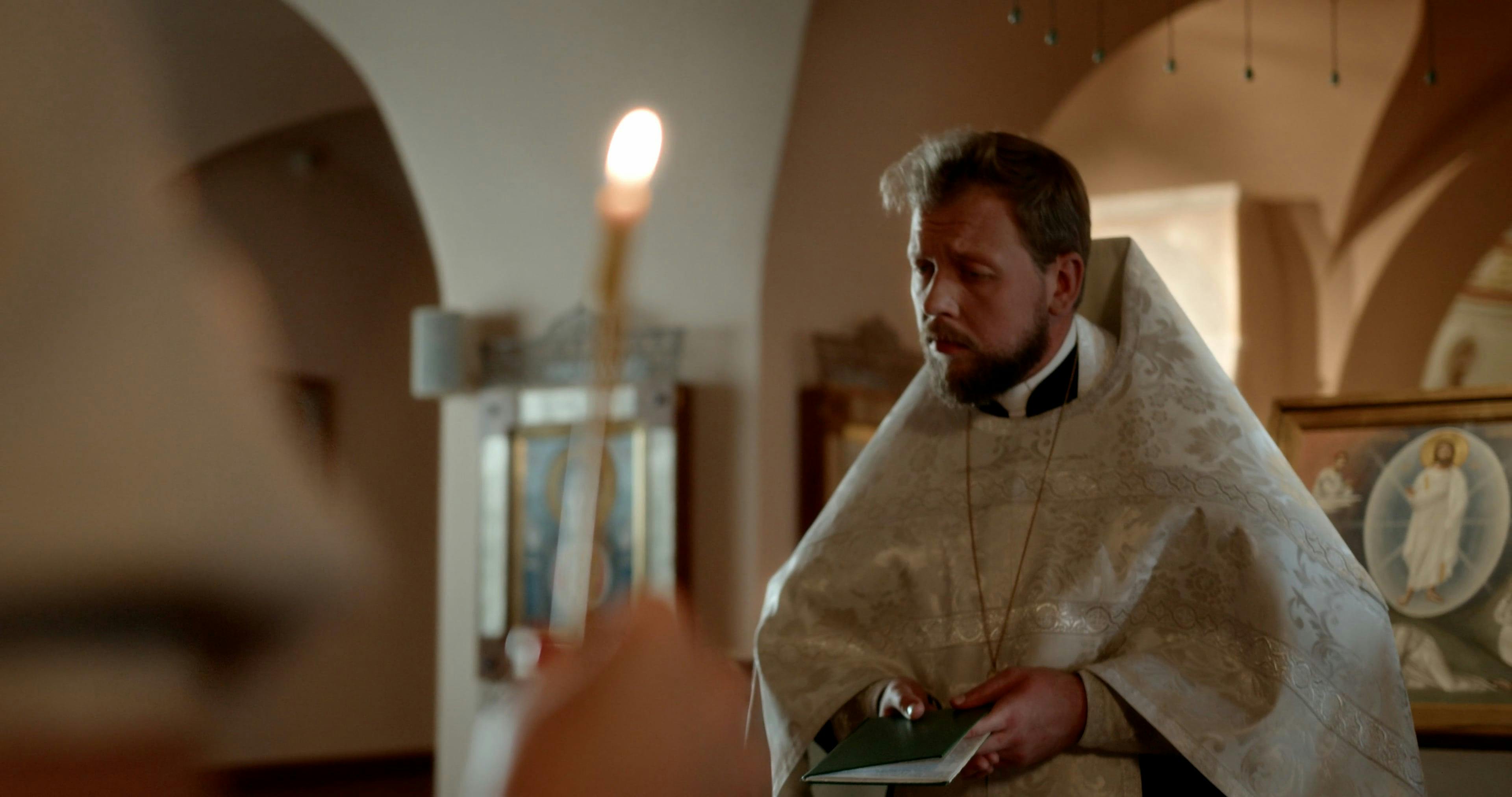 A Priest Cutting a Child's Hair During Baptism Free Stock Video Footage ...