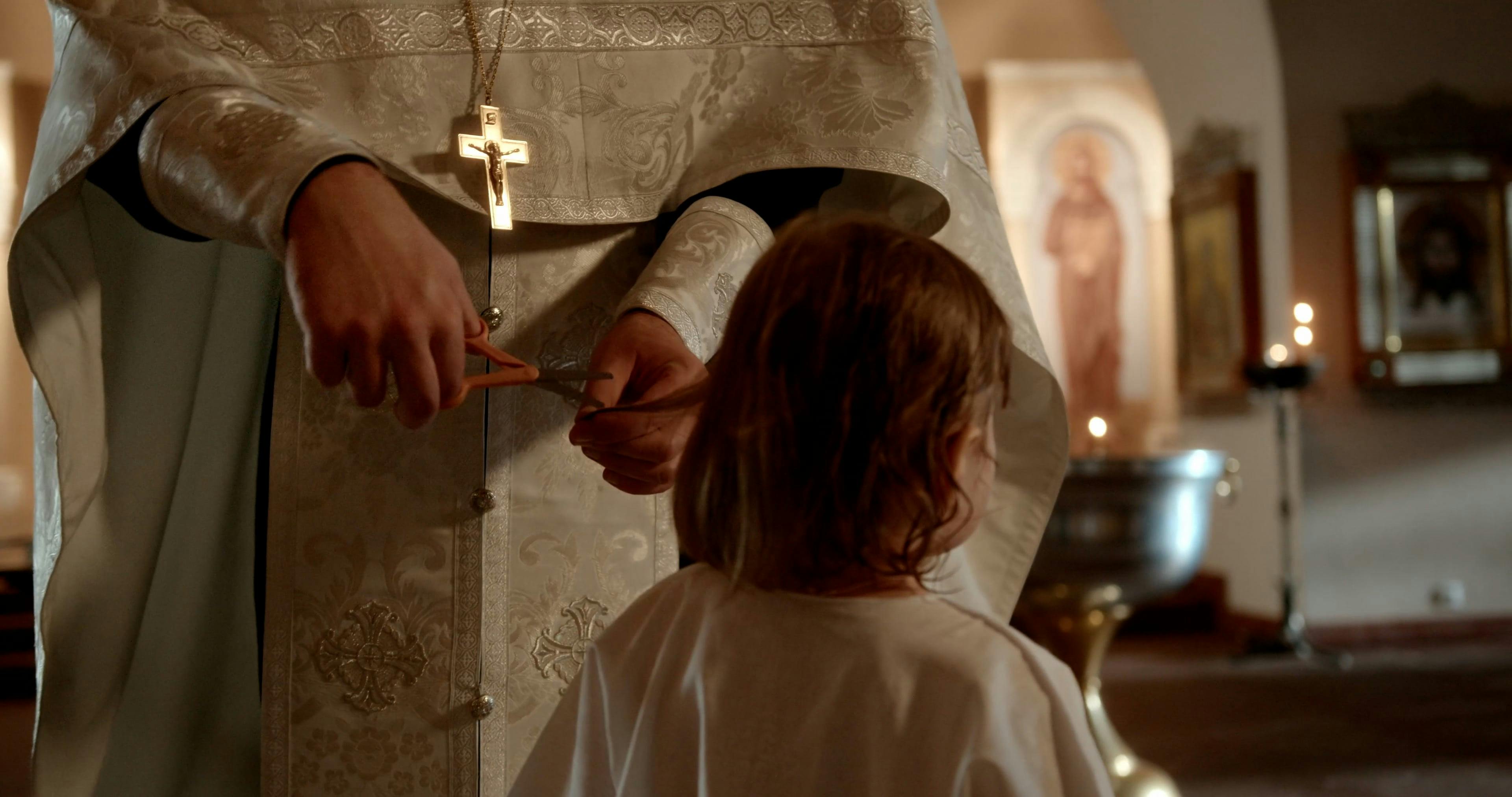 A Priest Cutting a Child's Hair During Baptism Free Stock Video Footage ...