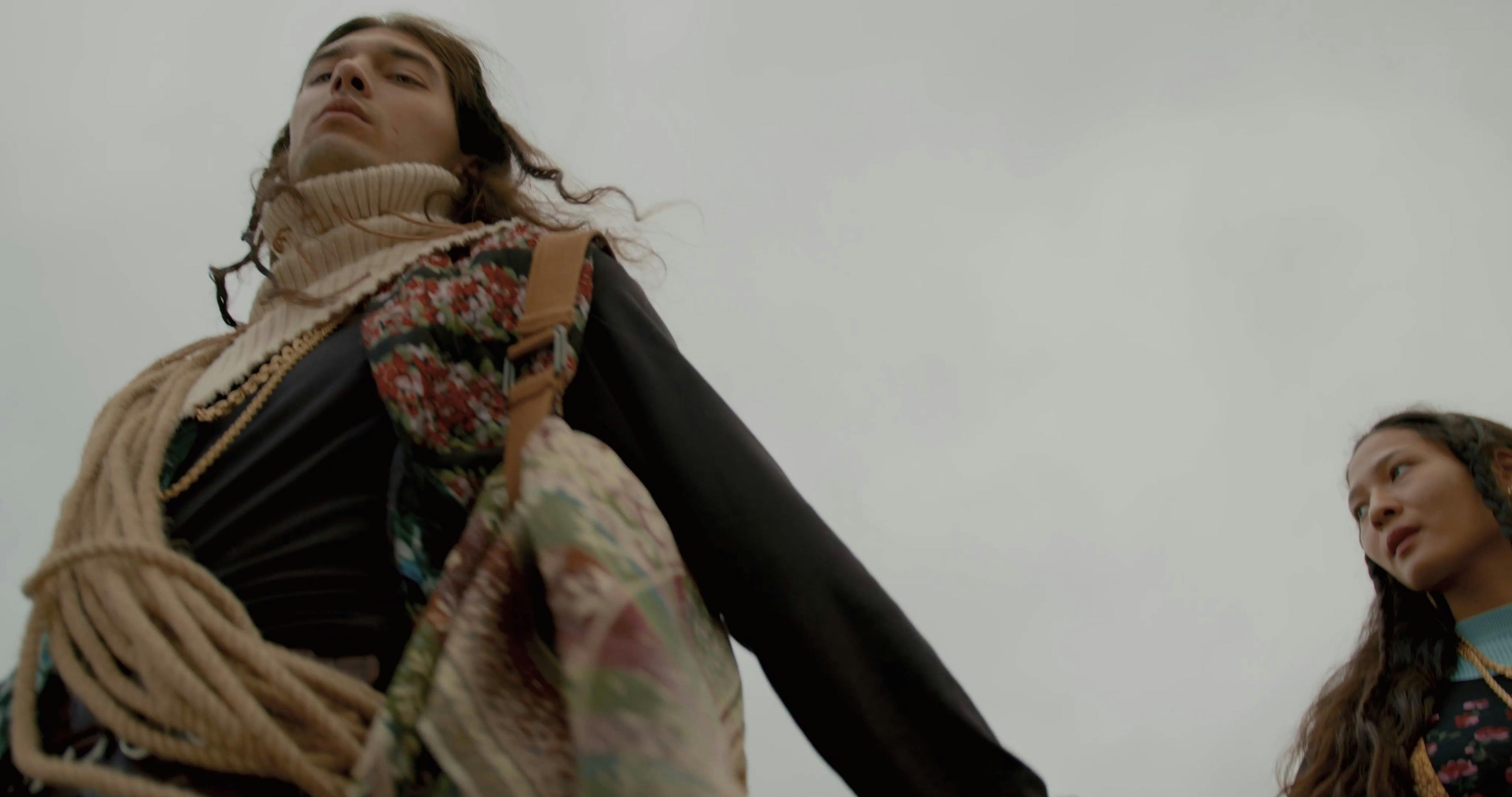 Low Angle Shot of a A Gypsy Couple Holding Hands While Walking in a ...