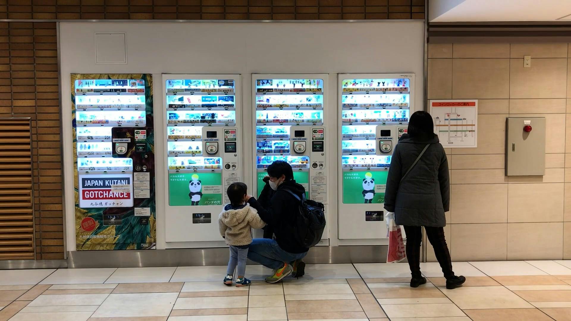 People Looking at Vending Machines · Free Stock Video