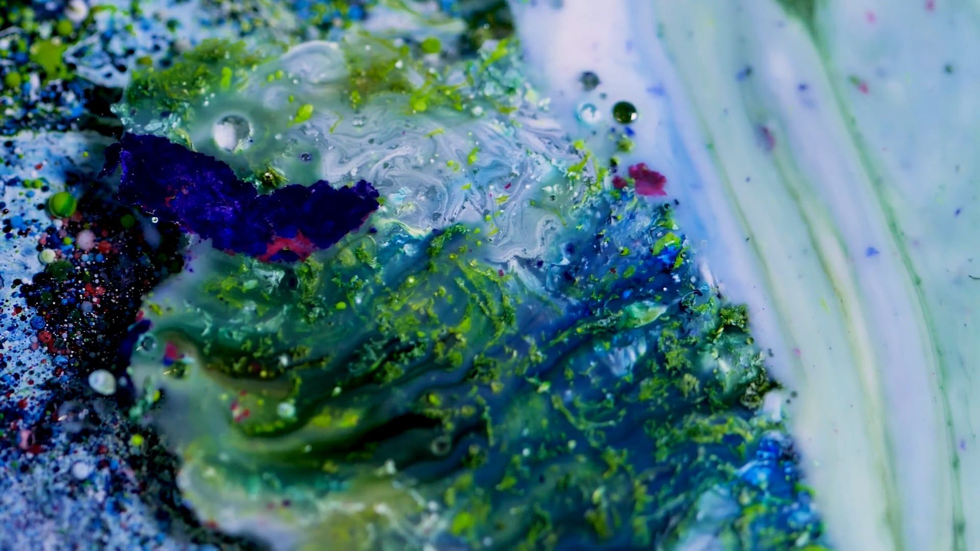 Close up Shot of Colorful Liquids Mixing in Slow Motion Free Stock ...