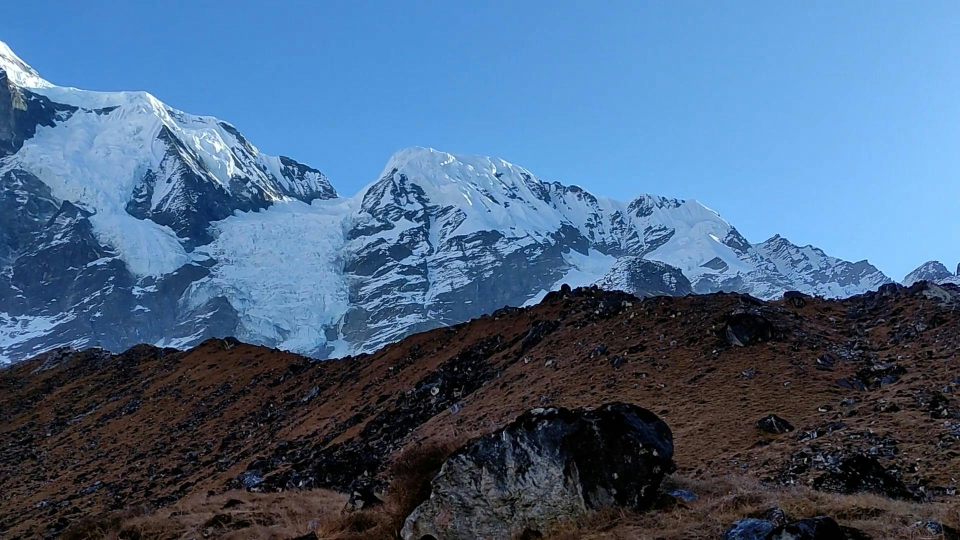 The Kargyak river with the granite mountain peak of Mount Gumbok ...