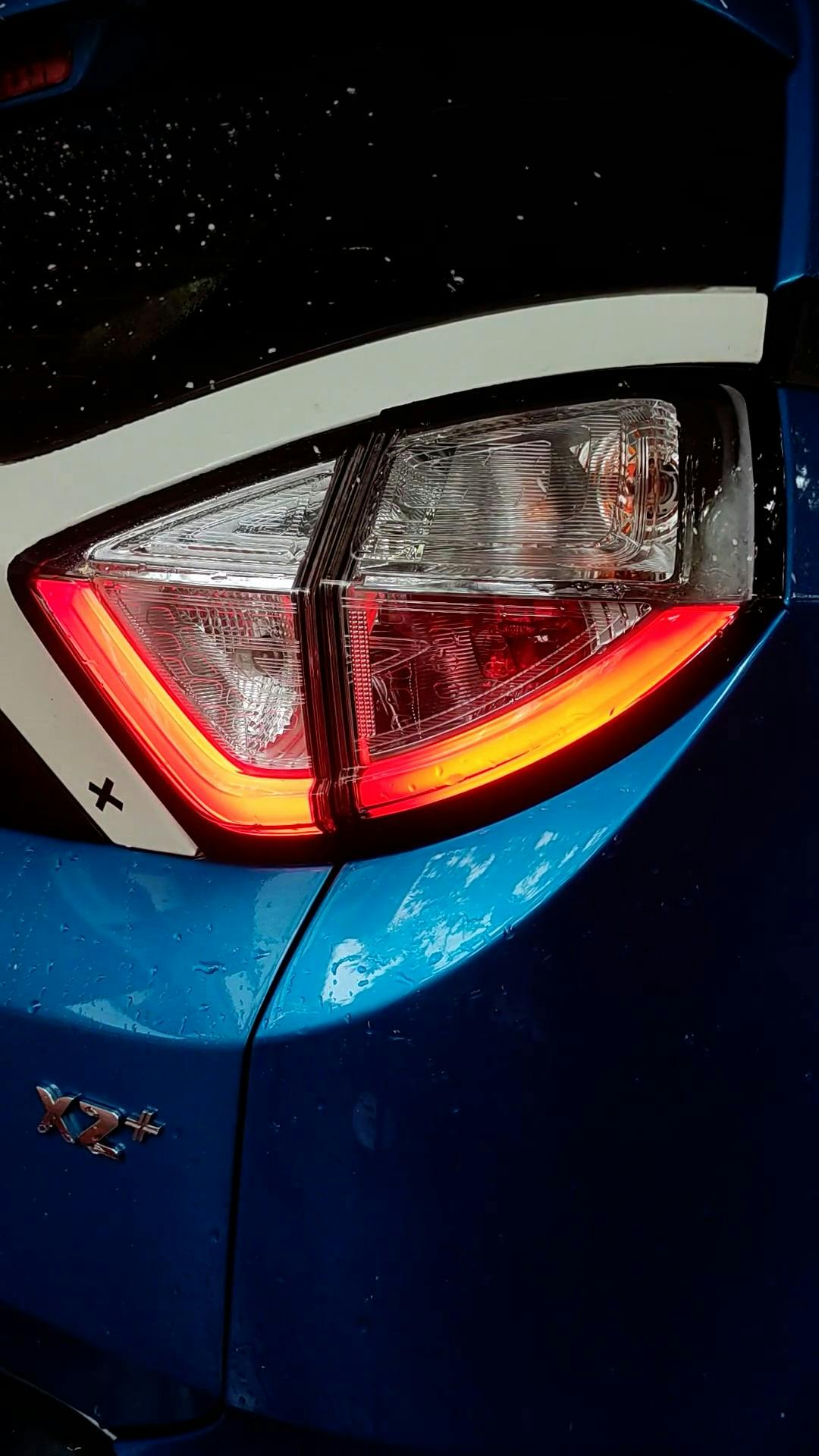 Close up on Car Light while Washing · Free Stock Video