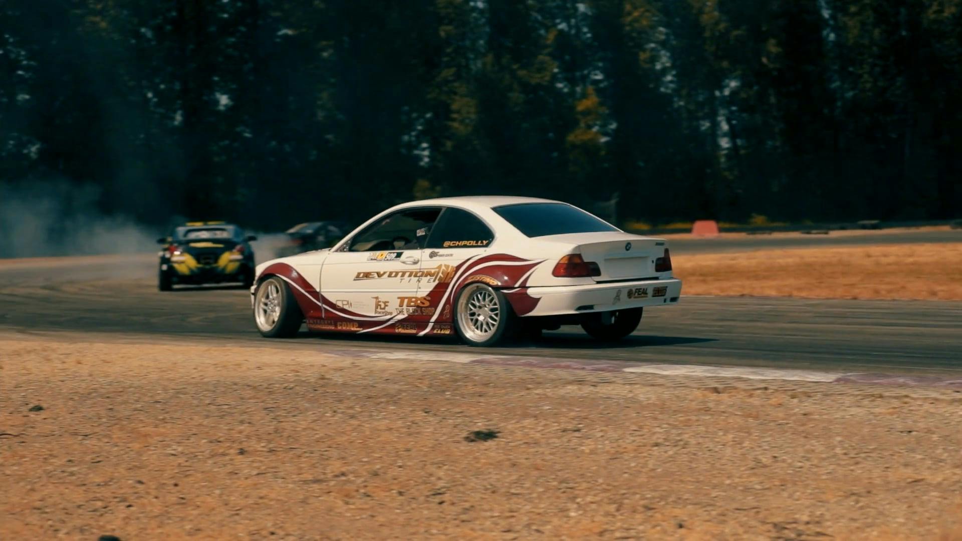 Slow Motion Footage Of People Looking Into Race Cars On Display Outdoor ...