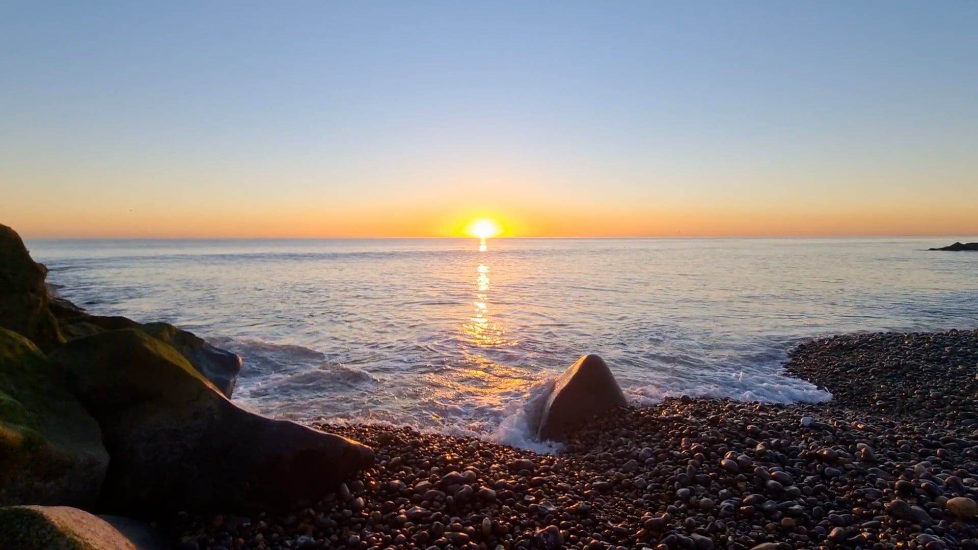 View Of Sunset Over The Horizon On A Beach Free Stock Video Footage ...