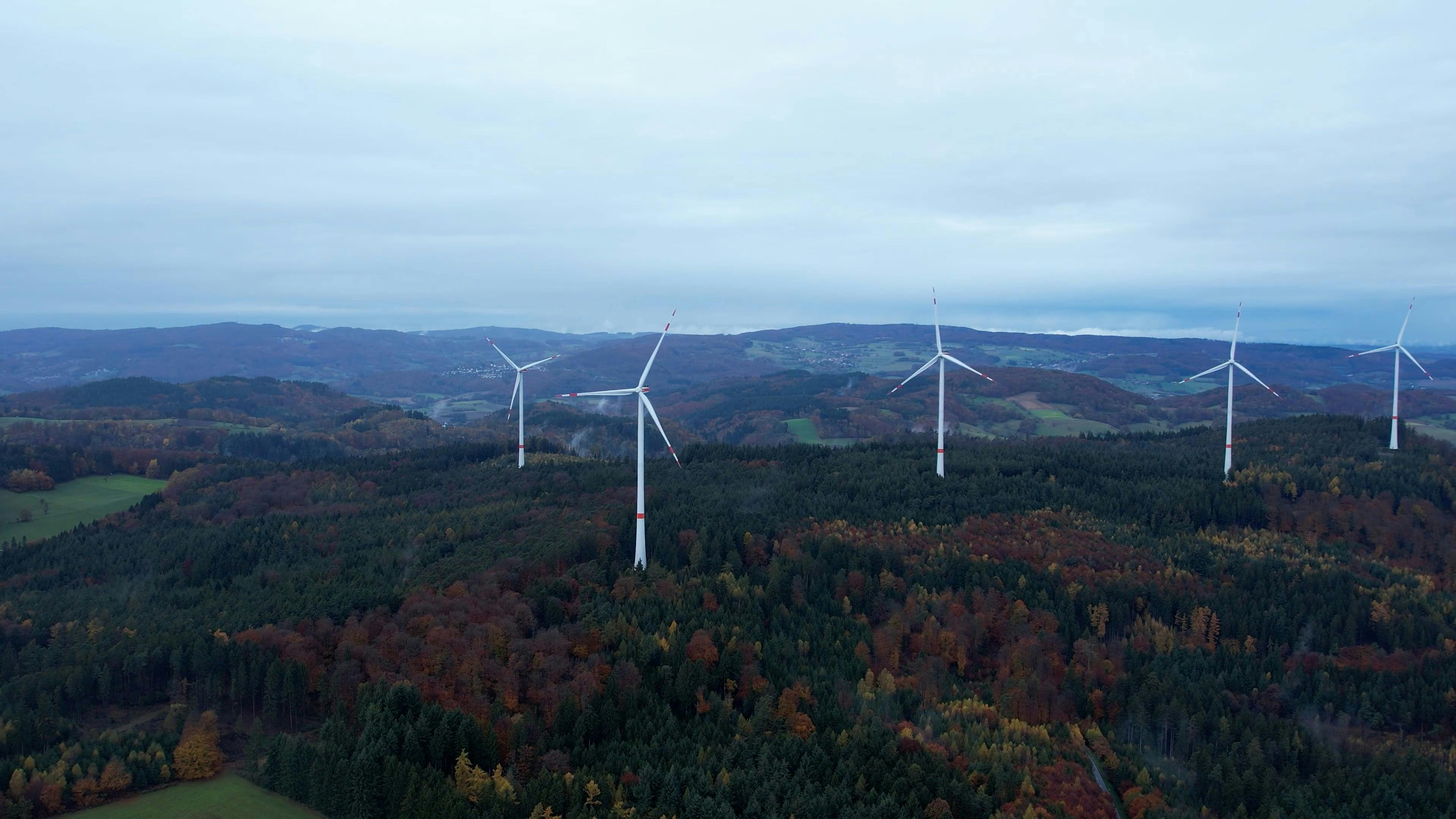 Vertical Wind Turbines In A Large Field · Free Stock Video