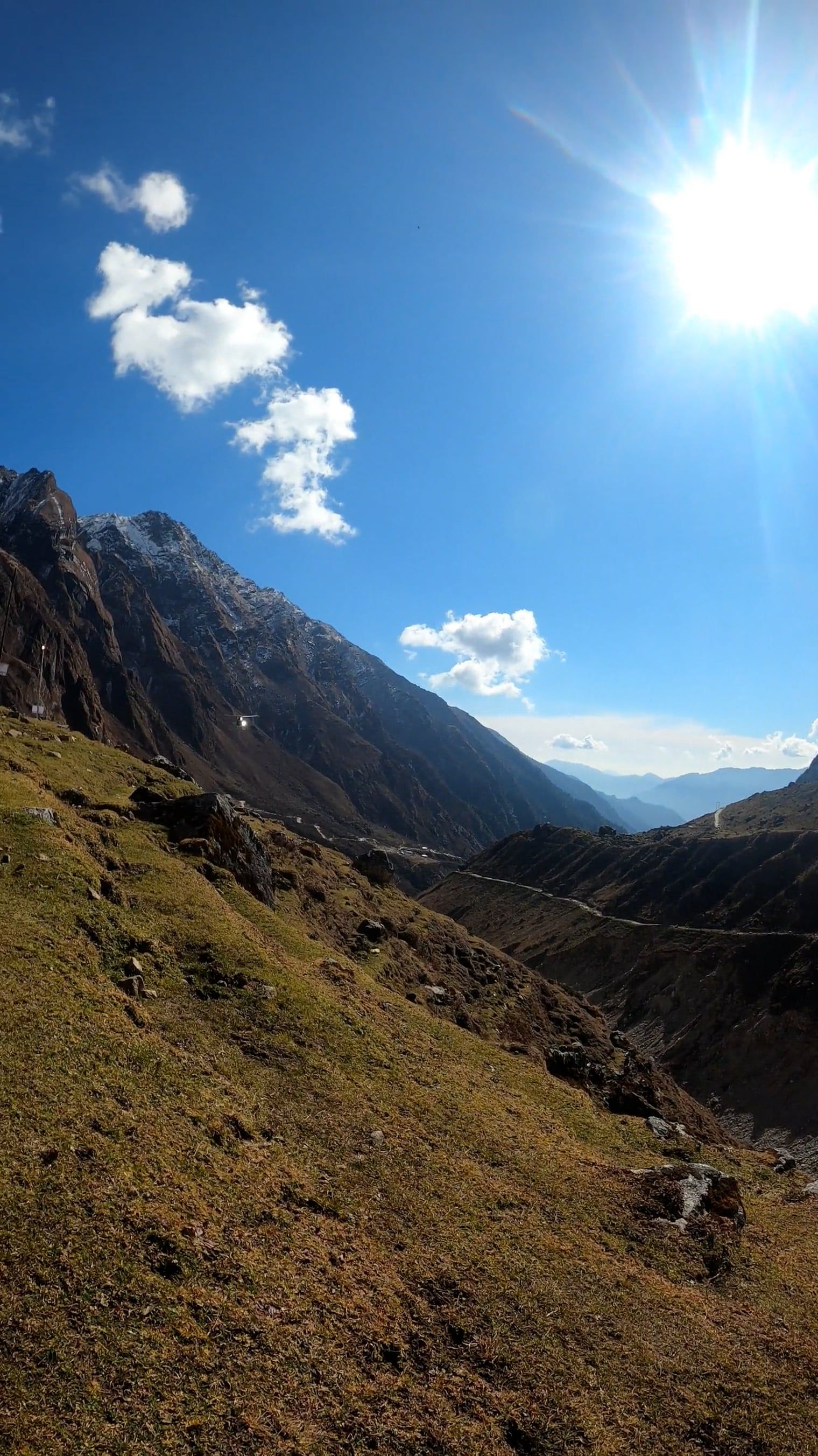 Helicopter Flying over Mountains and Hills · Free Stock Video