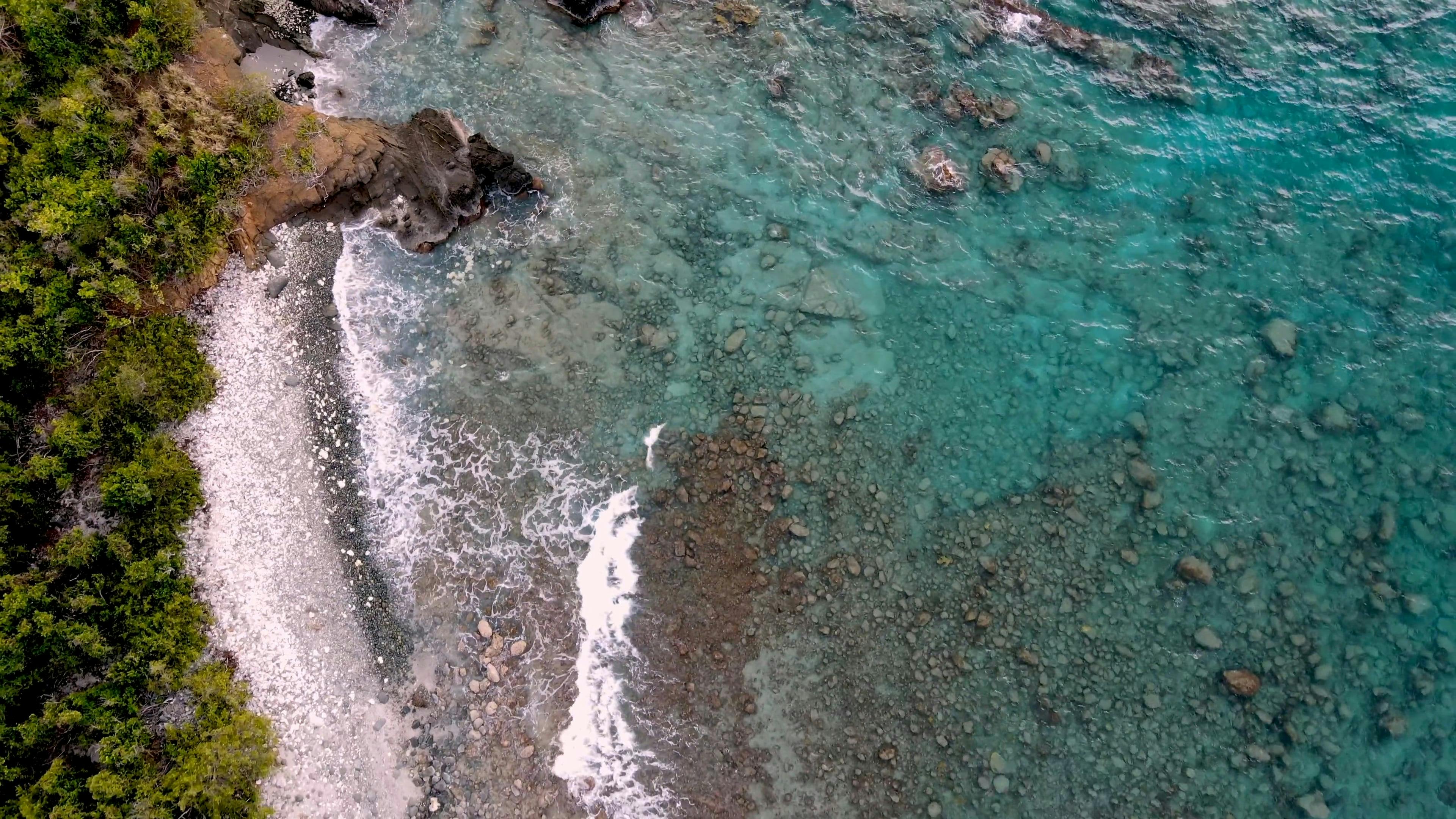 Video of a Beach and Rocky Cliff Free Stock Video Footage, Royalty-Free ...