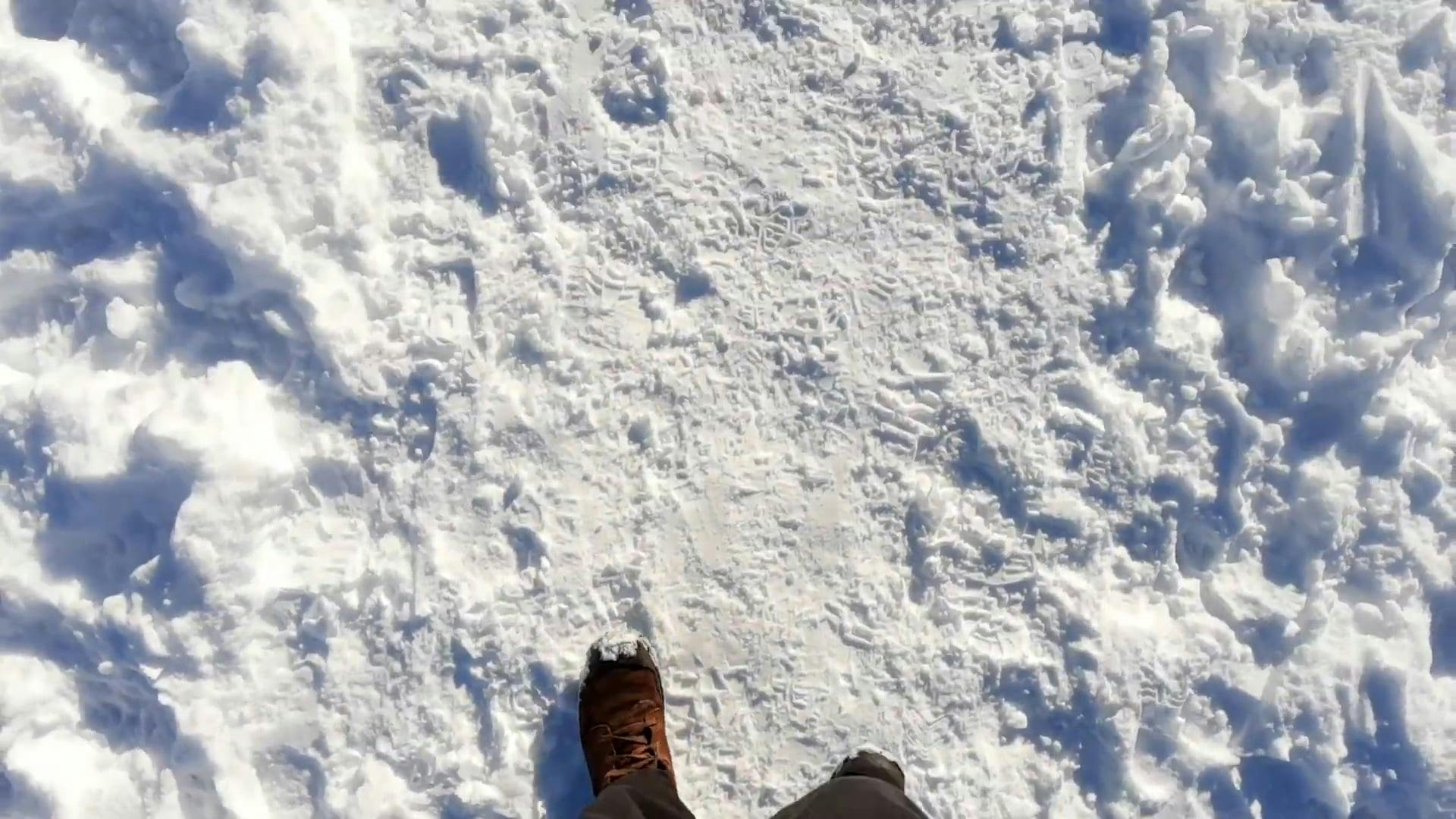Man Walking on Snow · Free Stock Video