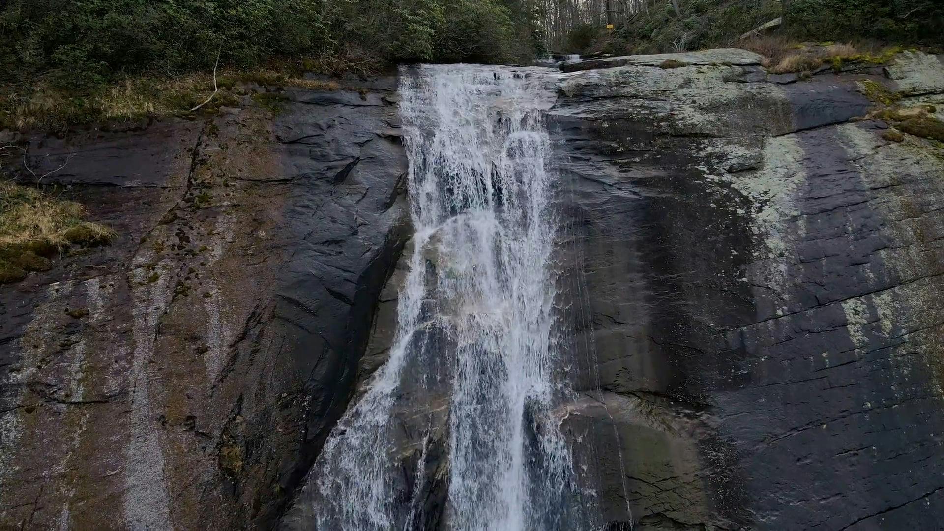 Tall Waterfall Flowing Down Rock Formation Free Stock Video Footage ...