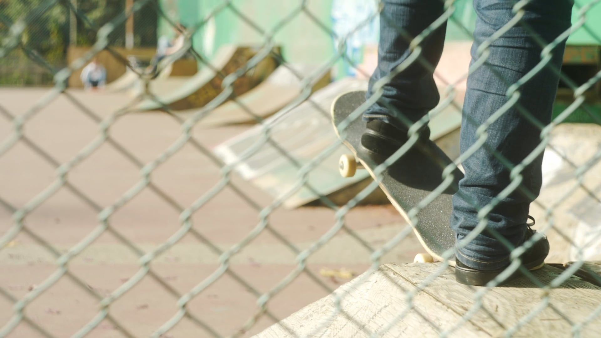Ground Level Shot of Skaters Practising Tricks at a Skatepark Free ...