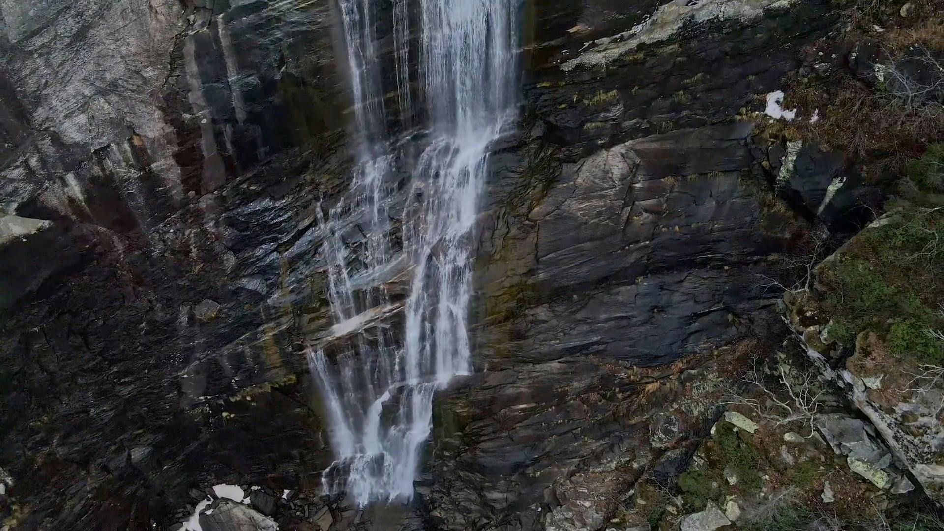 A Waterfalls Cascading Through Multi-layer Of Rocks Formation Free ...