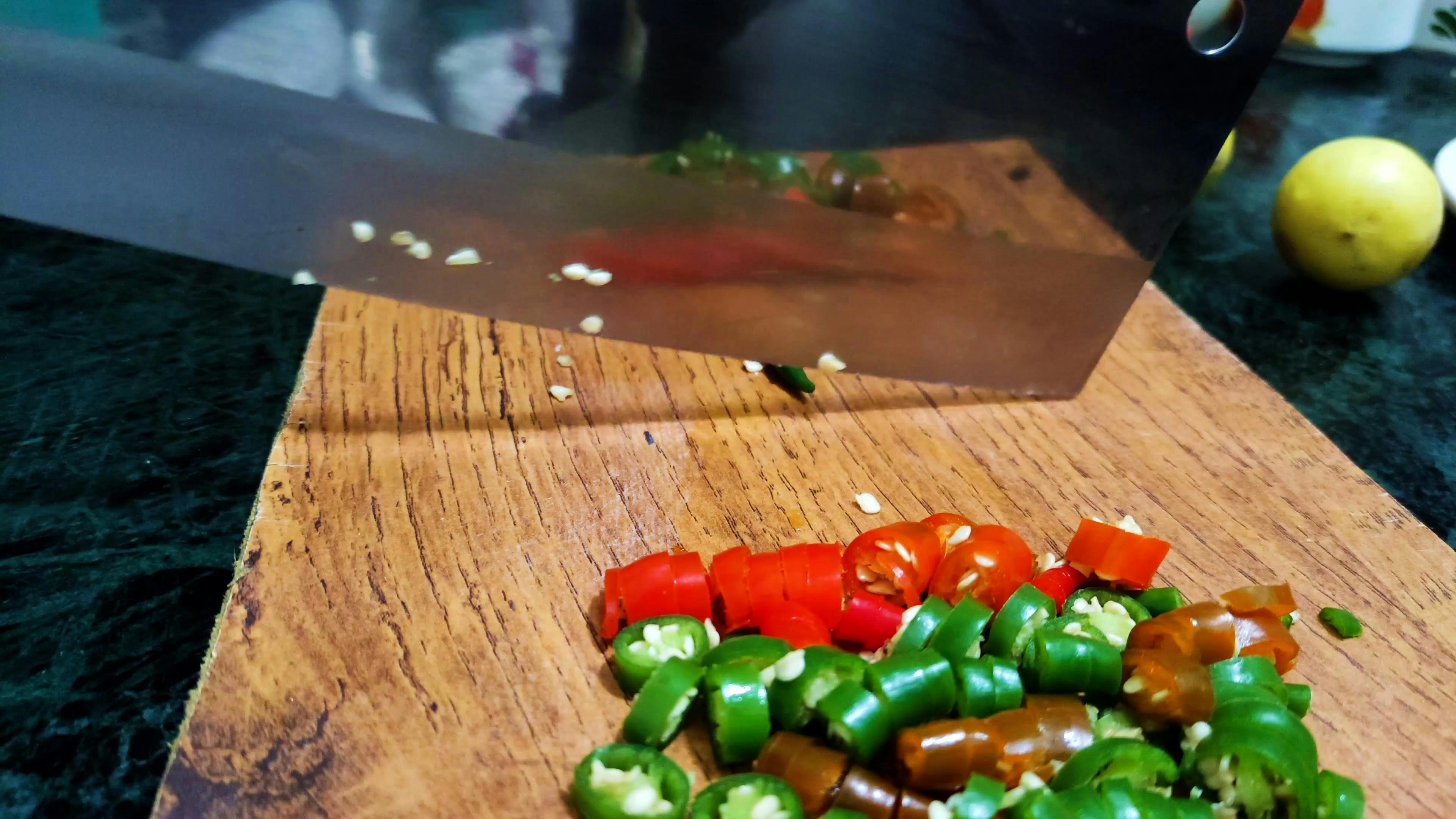 Close up of a Chef Cutting Chili Peppers with a Cleaver Knife · Free ...