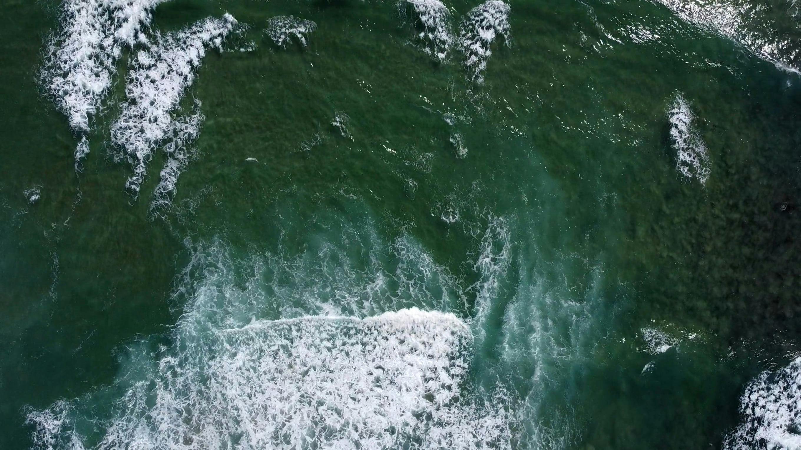 Aerial View of Ocean Waves Crashing on Shore Free Stock Video Footage ...