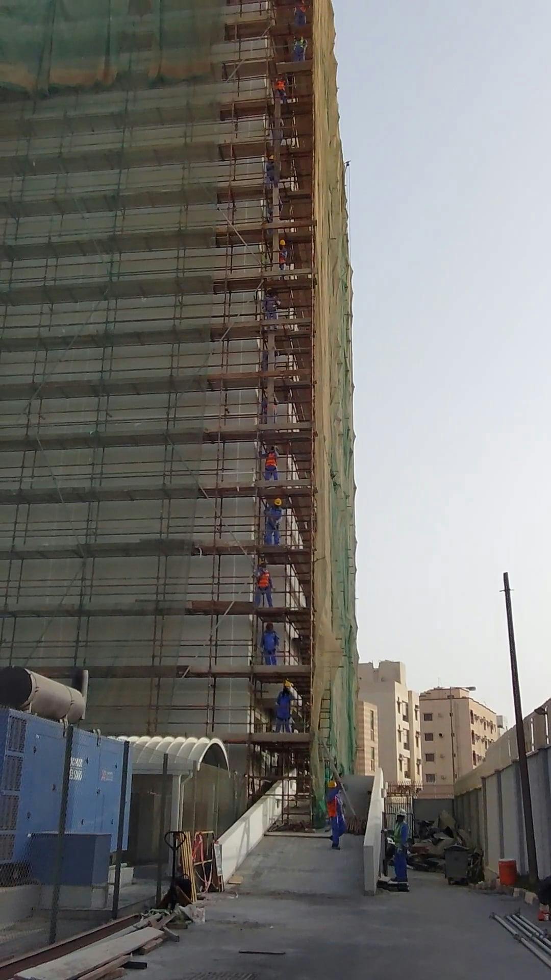 Low Angle Footage Of Construction Workers Balancing On Steel ...