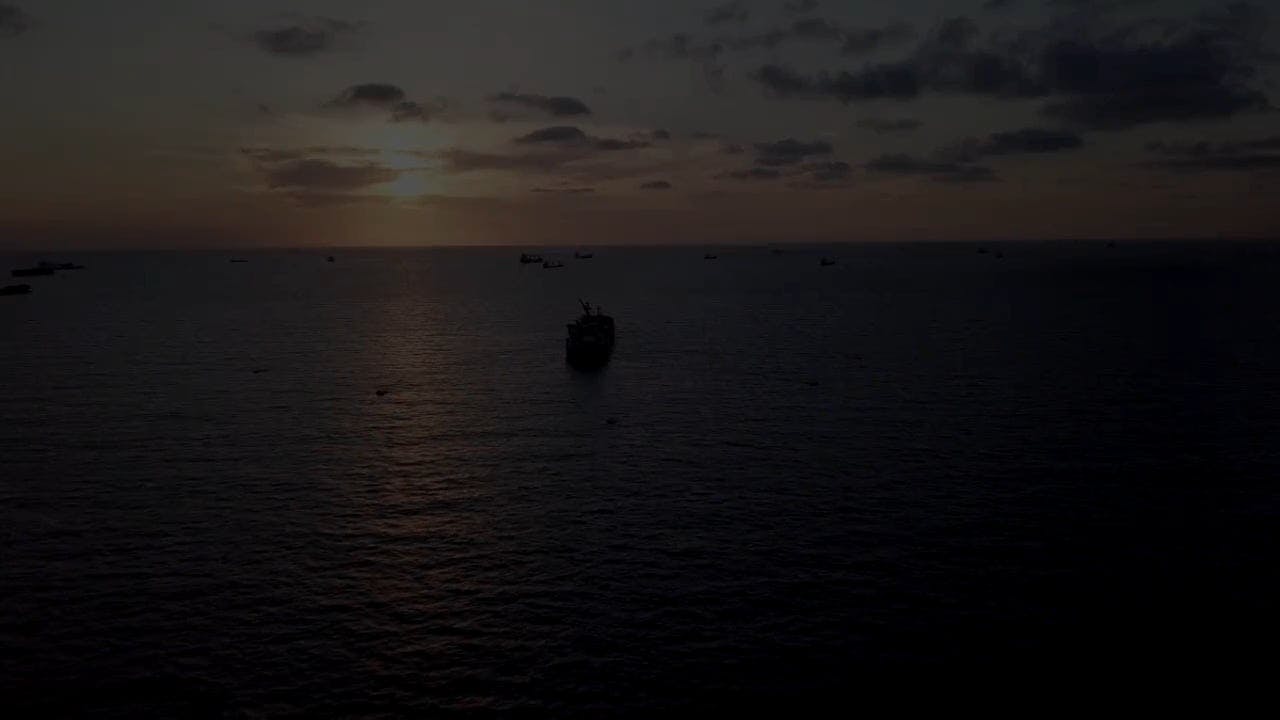 Aerial Footage Of A Cargo Ship At Sea Loaded With Containers · Free ...