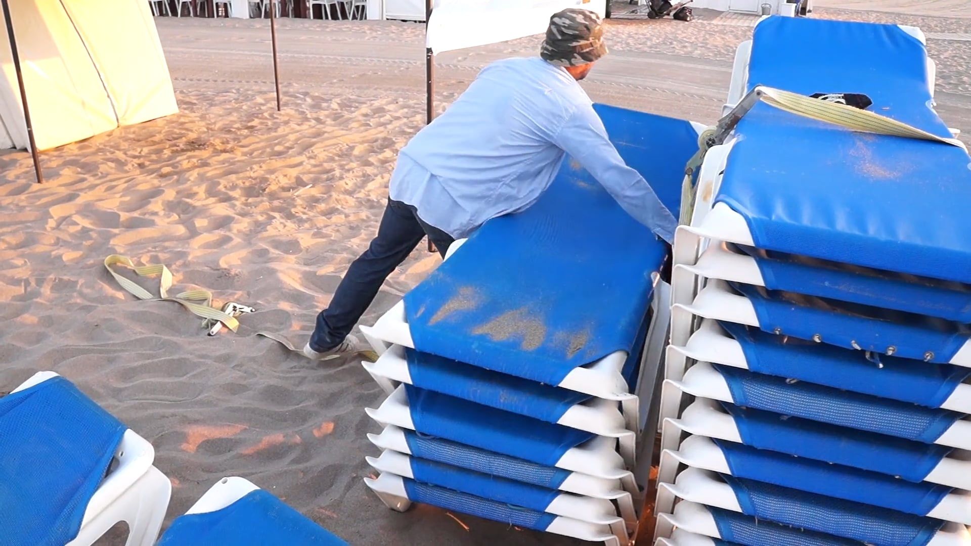 Man Working At The Beach · Free Stock Video