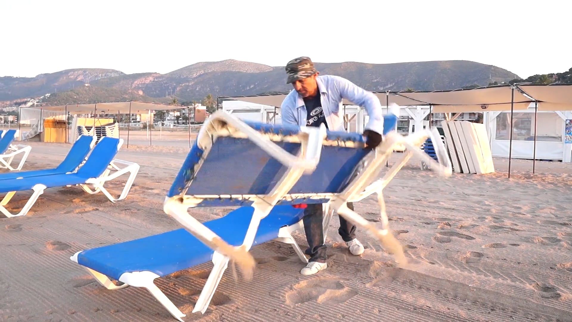Working On The Beach · Free Stock Video