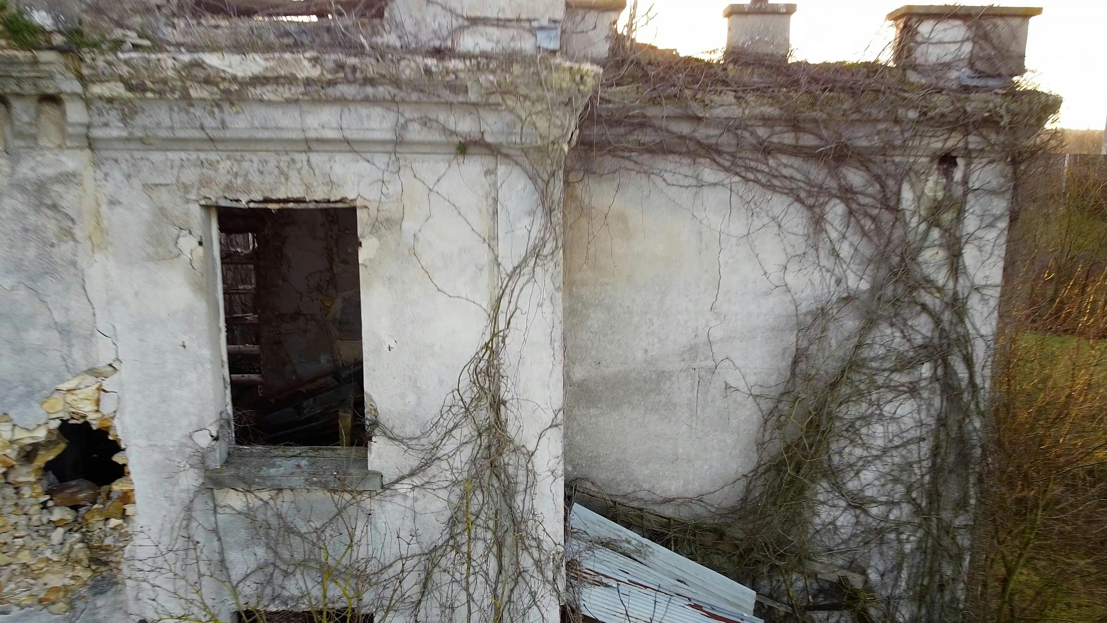 Back View of a Man Running towards an Abandoned House in Slow Motion ...