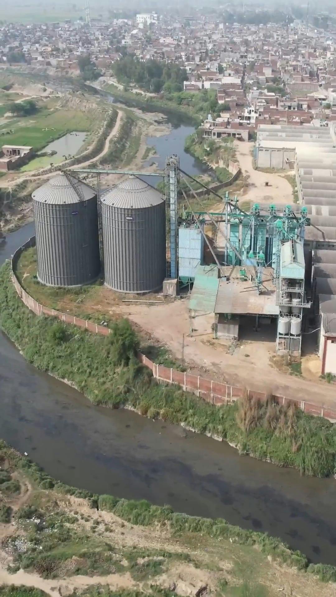 Factory by River Free Stock Video Footage, Royalty-Free 4K & HD Video Clip