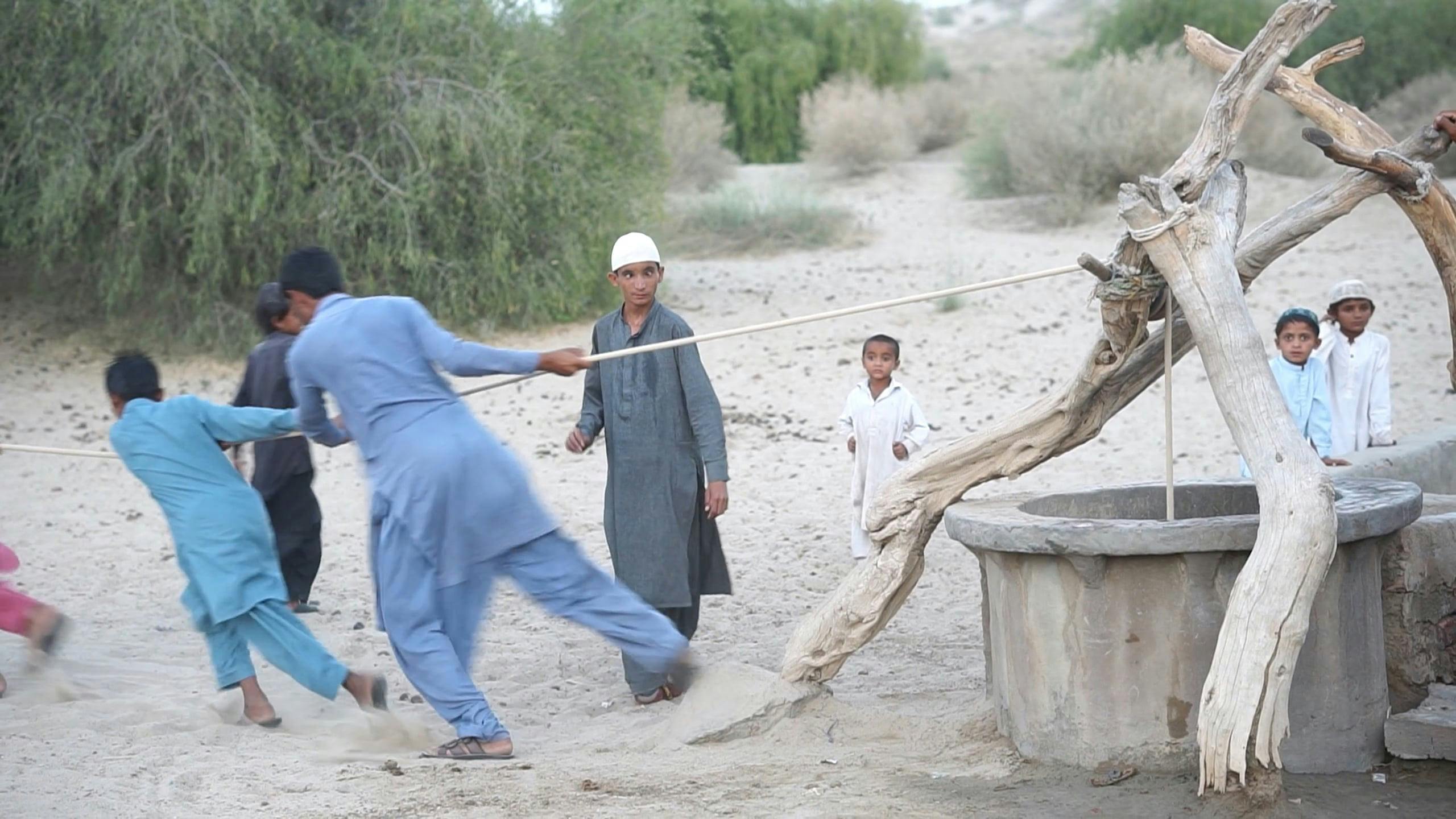 Children Getting Water from a Well in the Desert Free Stock Video ...