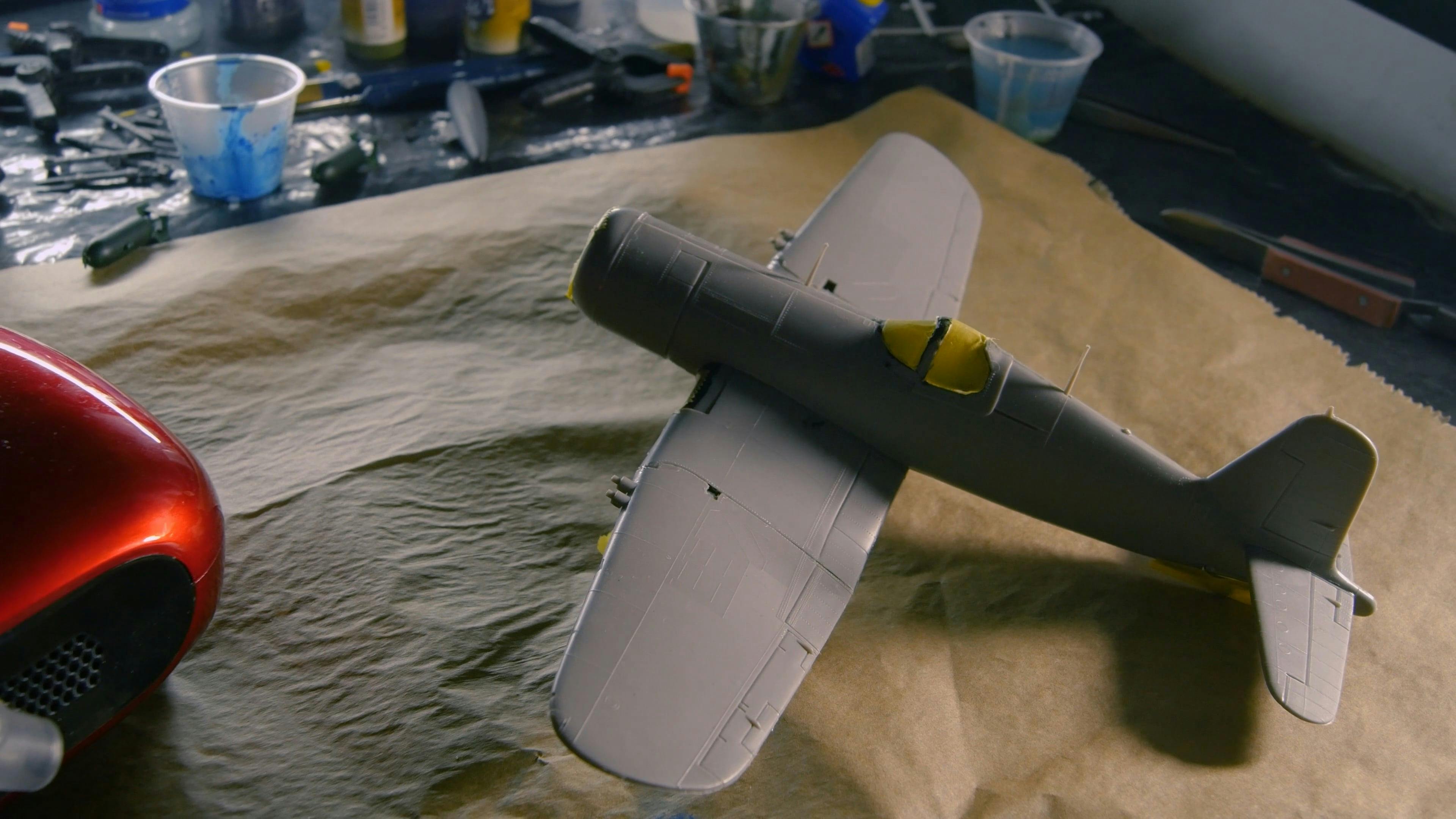 A Person Painting a Scale Model Plane with an Airbrush Pen Free Stock ...