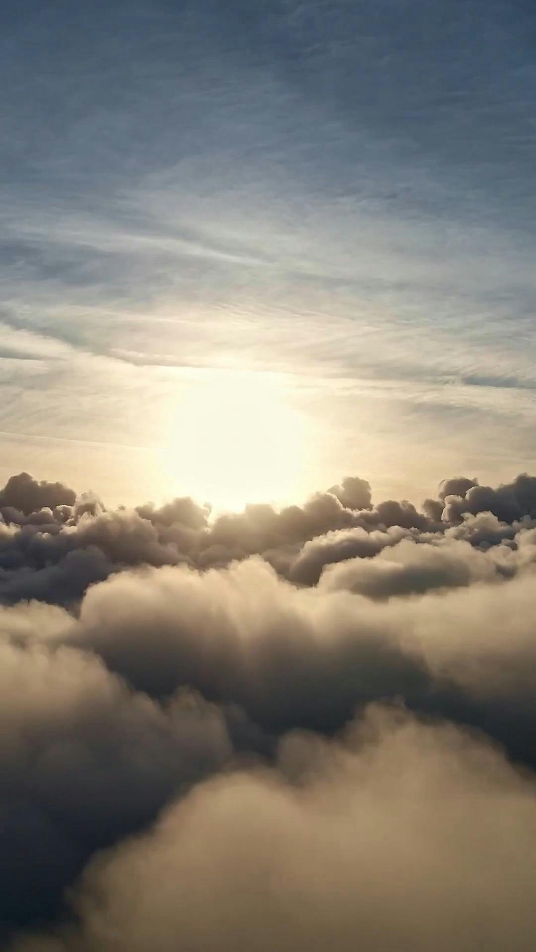 Sun over Clouds Free Stock Video Footage, Royalty-Free 4K & HD Video Clip