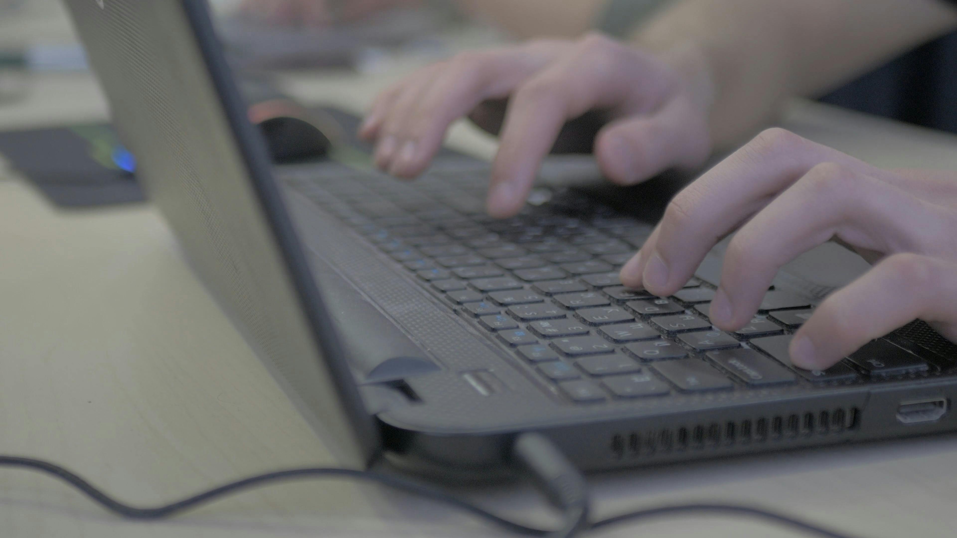 Close up of a Person Typing on a Laptop Computer Free Stock Video ...