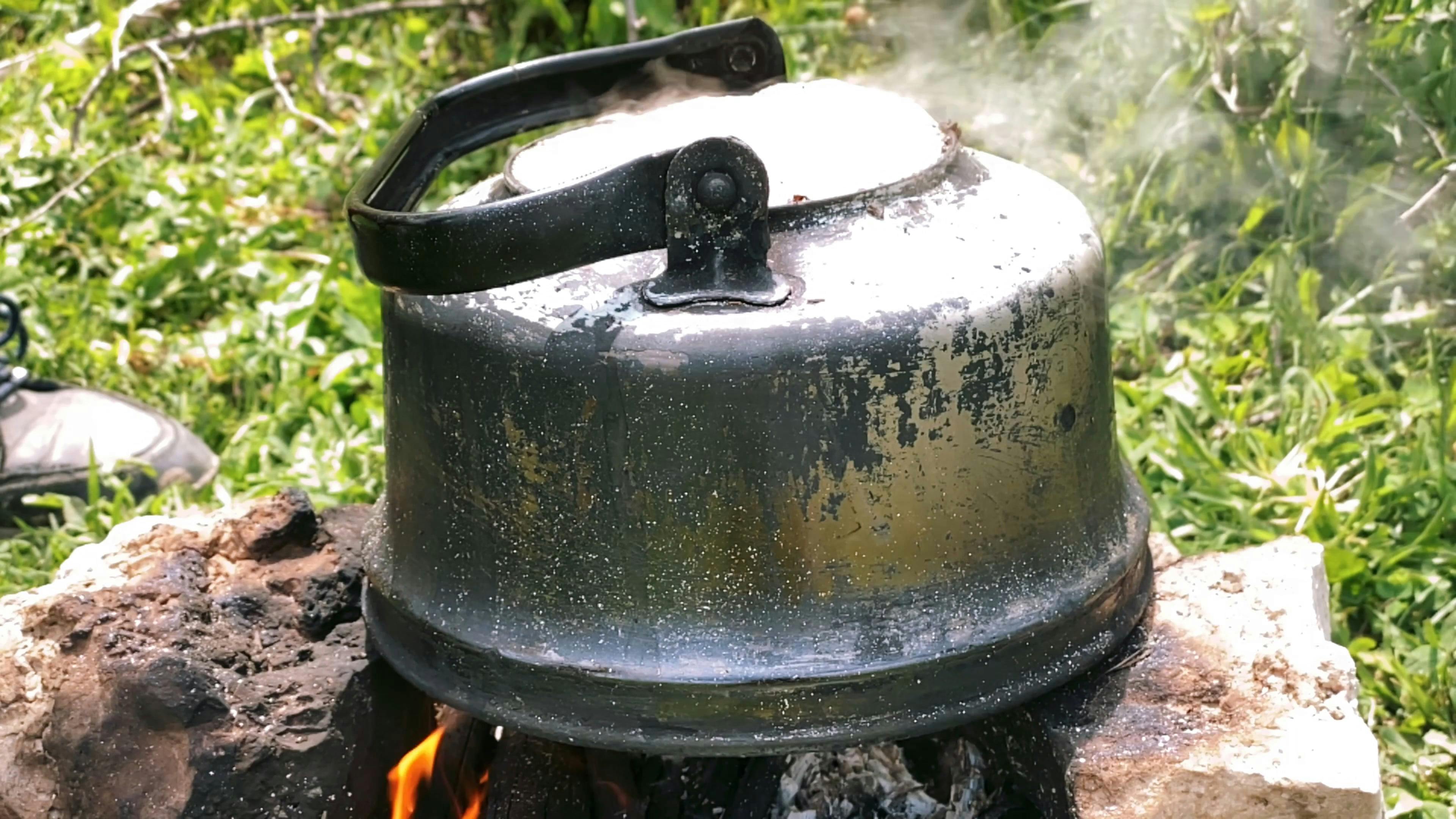 Silver Kettle on Brown Wood Log Free Stock Video Footage, Royalty-Free ...