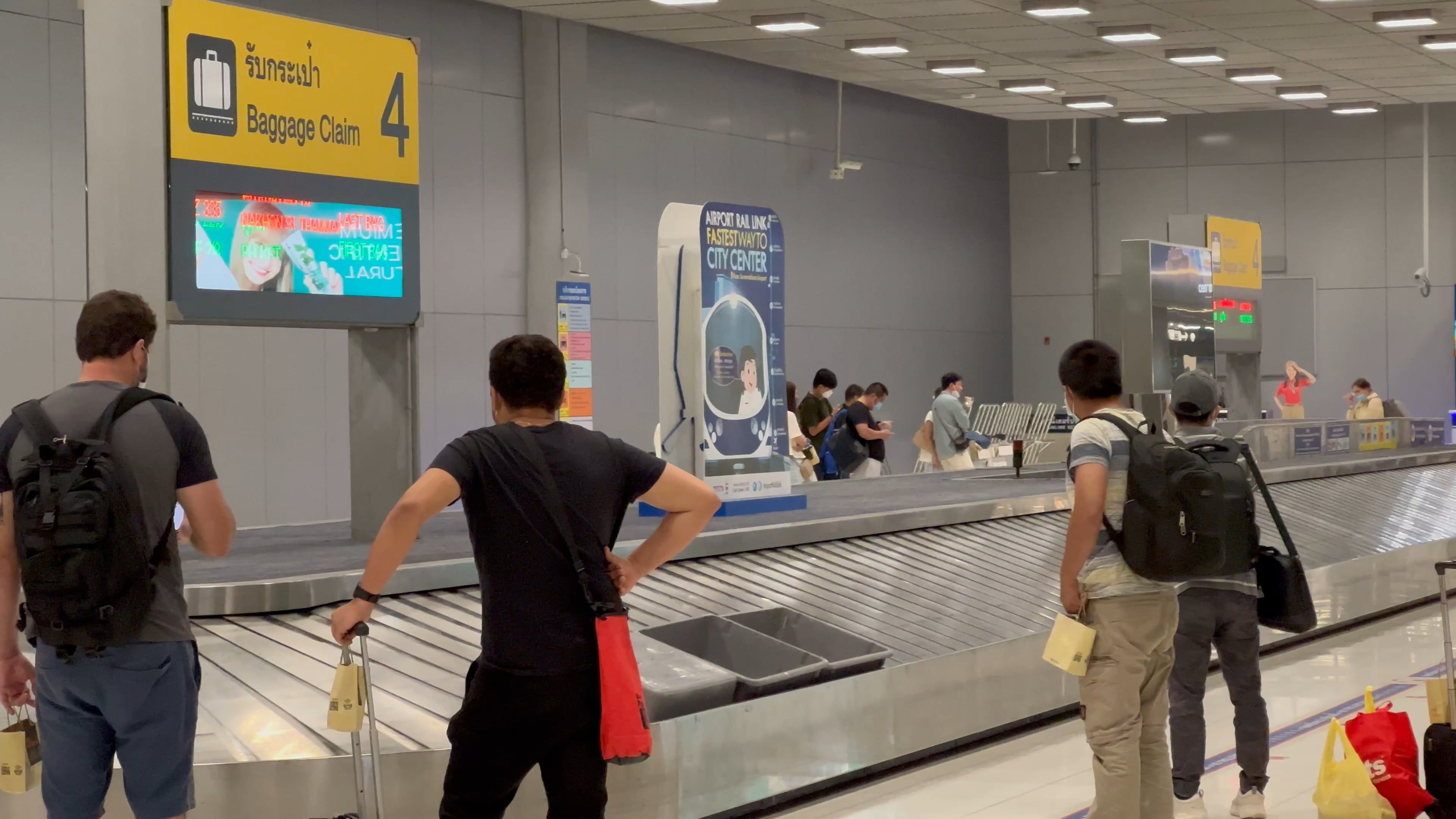 Group of People at Baggage Claim at Airport Terminal Free Stock Video ...