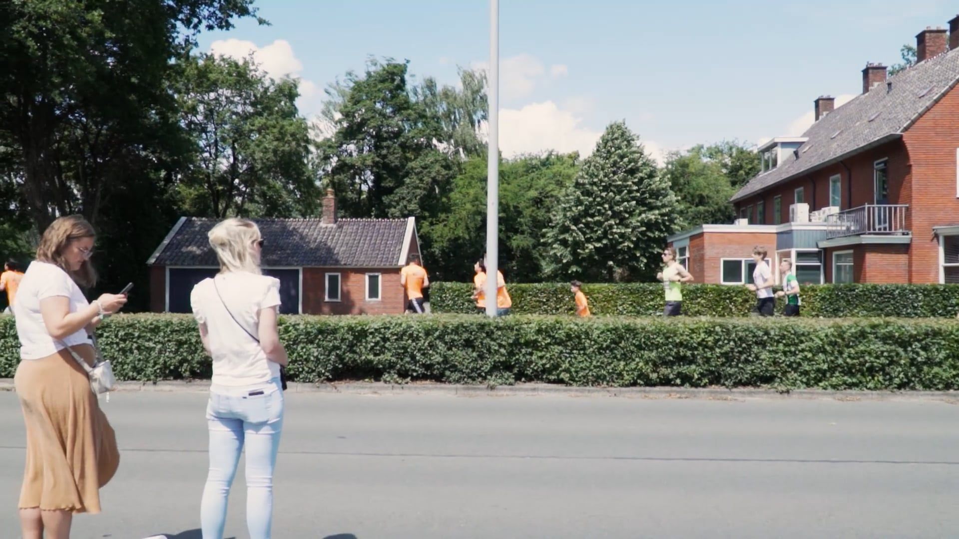 People Looking at Marathon Runners Passing by Free Stock Video Footage ...