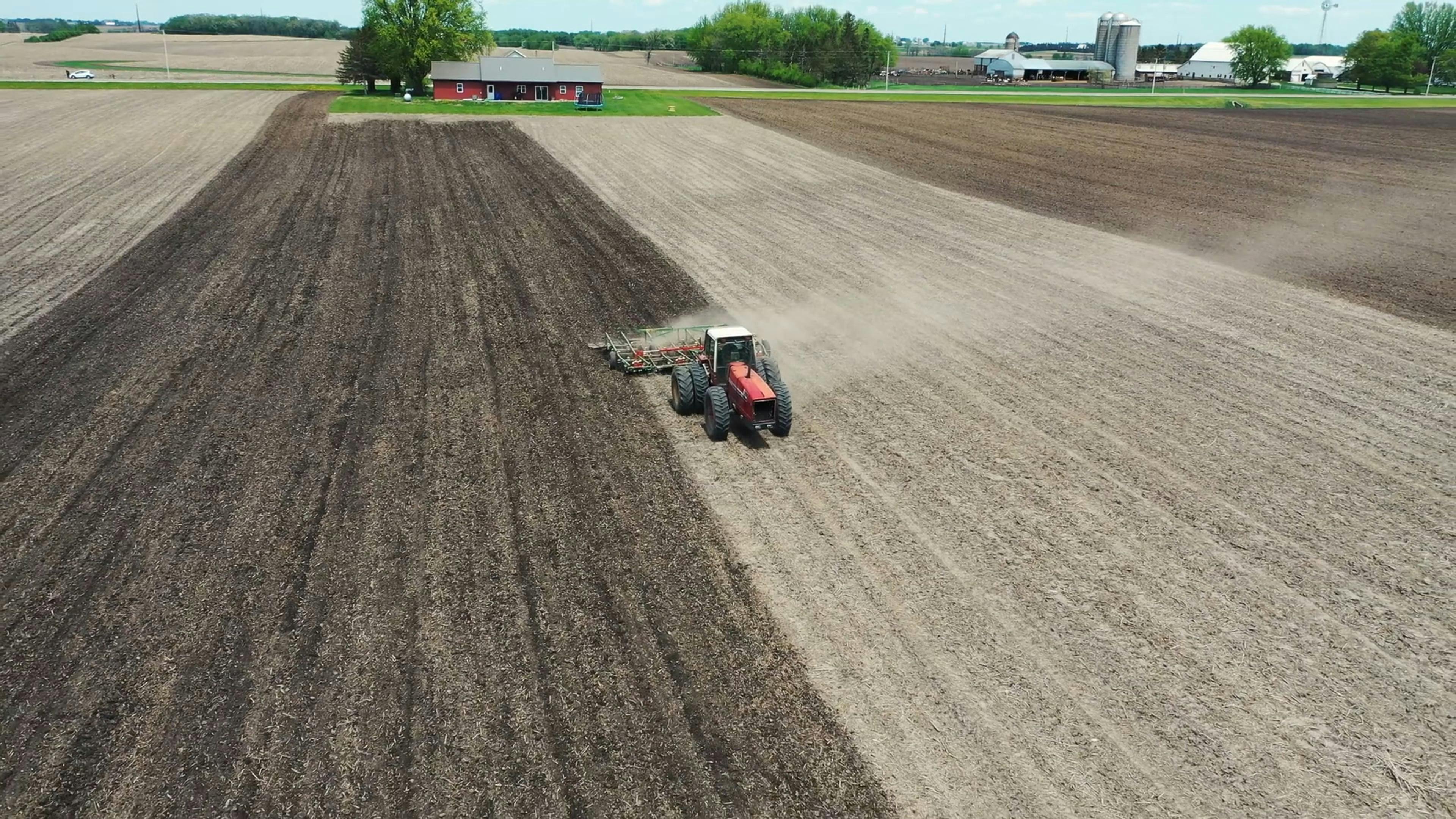 Drone Shot of a Tractor Plowing a Field Free Stock Video Footage ...