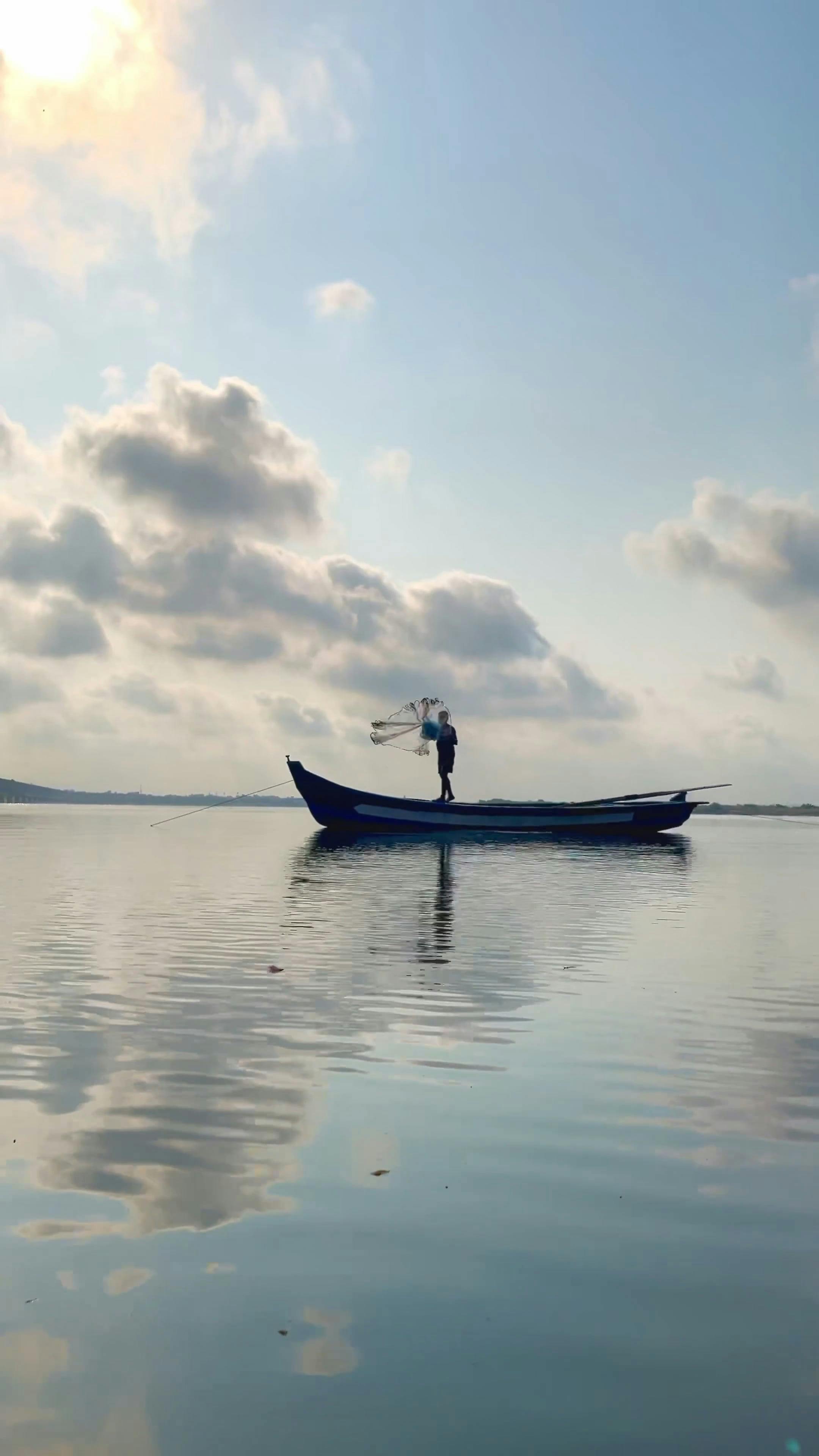 Man Casting Net While Fishing From a Boat Free Stock Video Footage ...