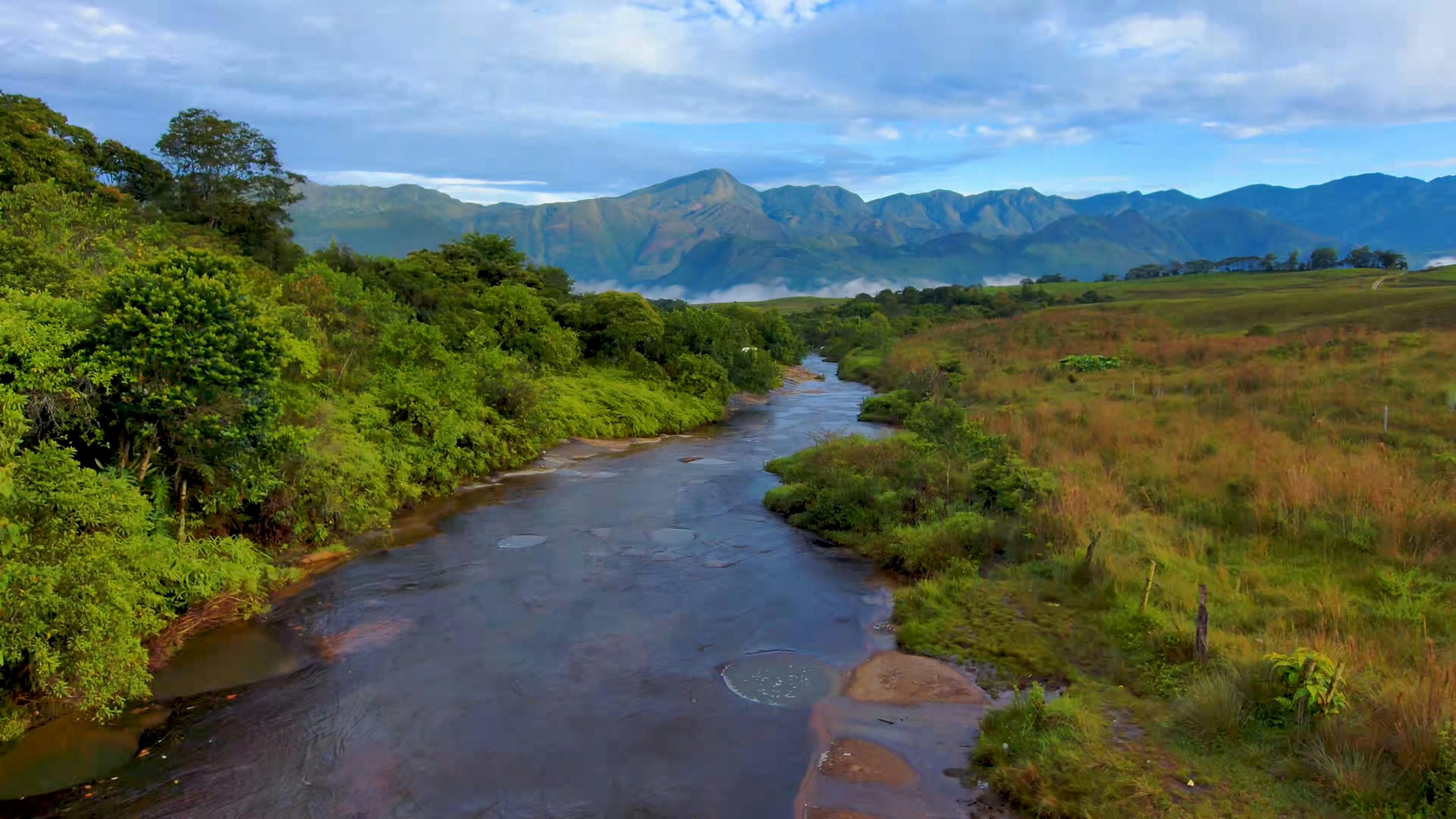 Drone Shot of a River and Distant Mountain Range Free Stock Video ...